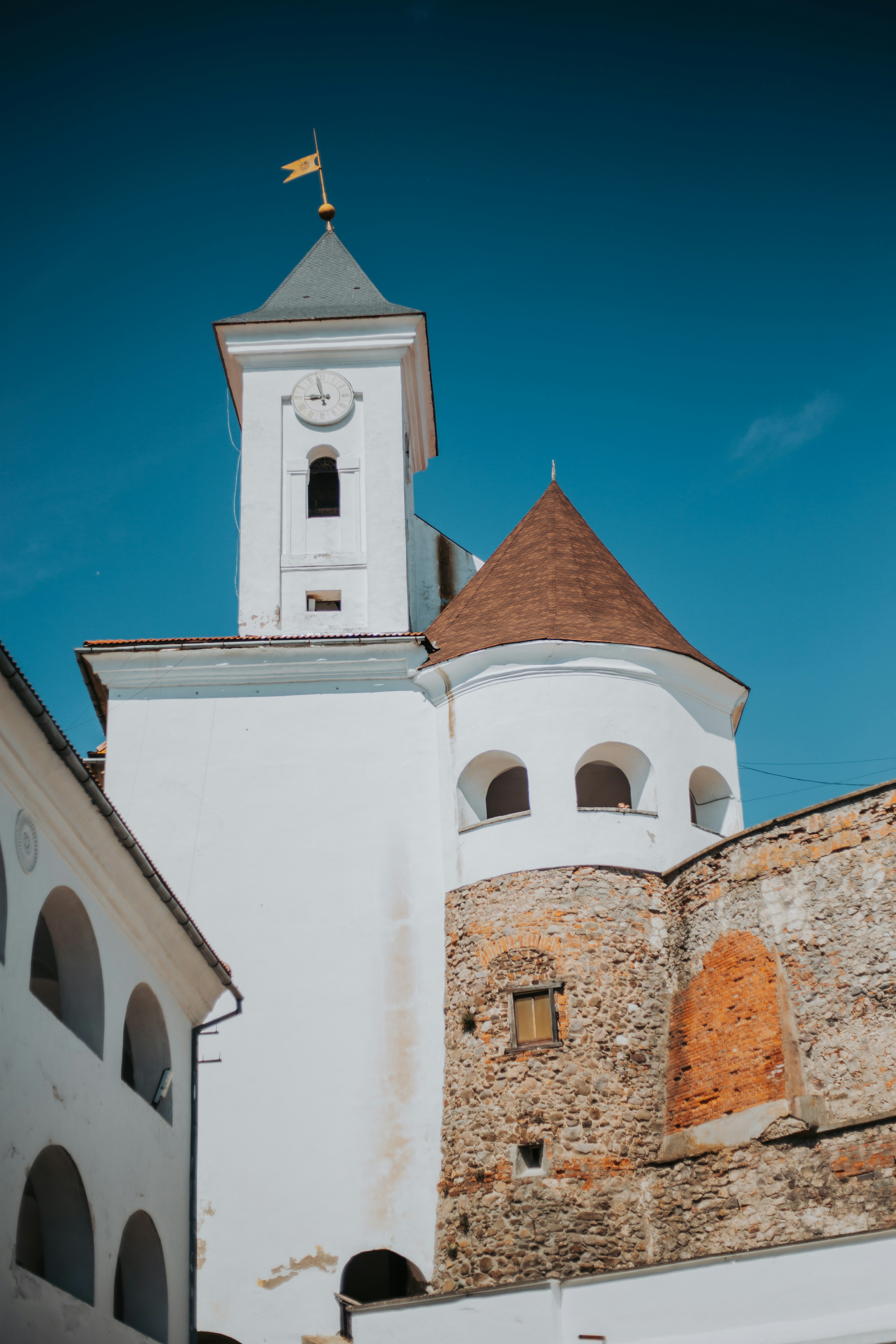 Towering White Chapel Against a Cobalt Sky