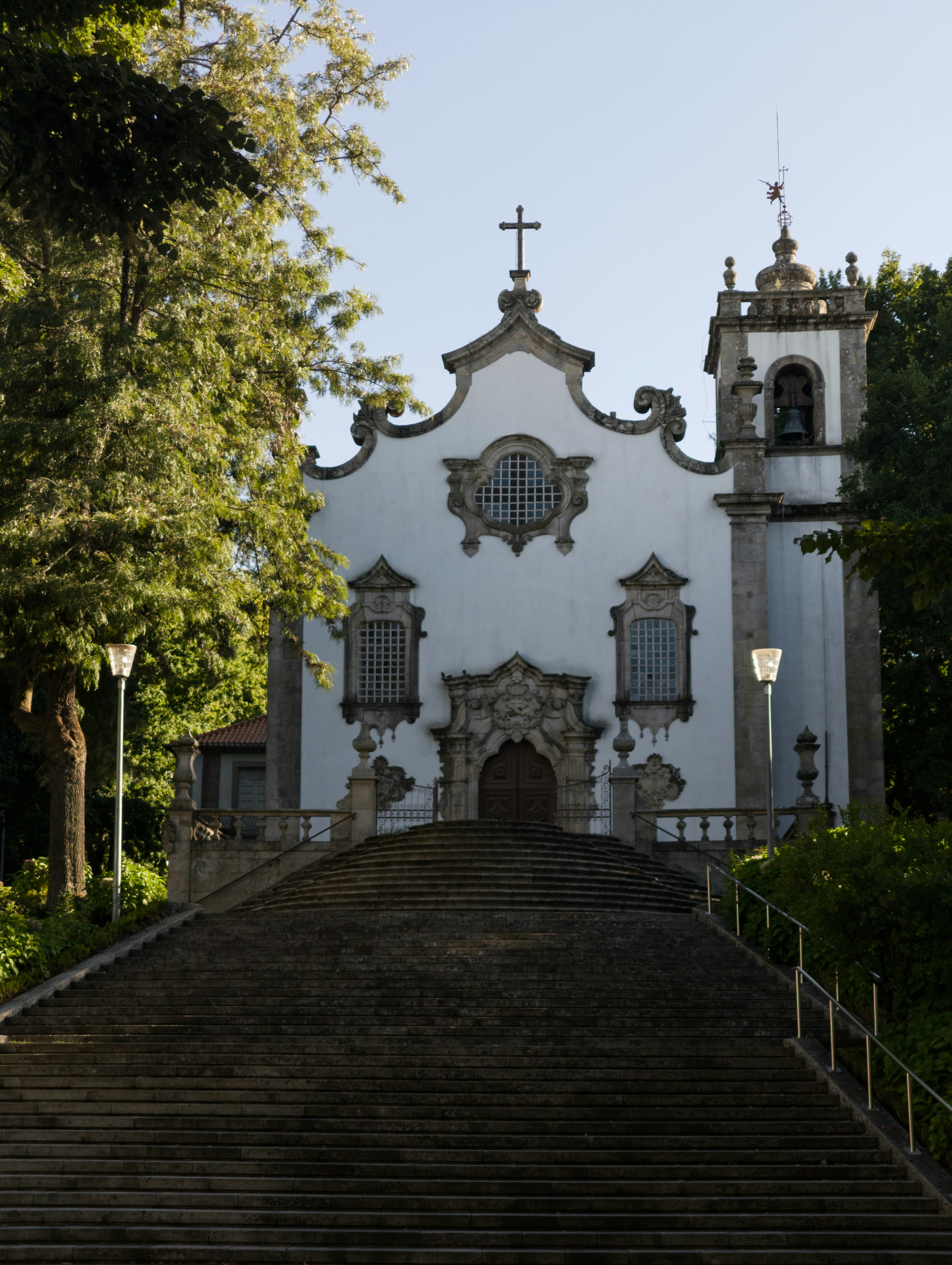 Steps to the Baroque Facade: A Sunlit Holy Staircase