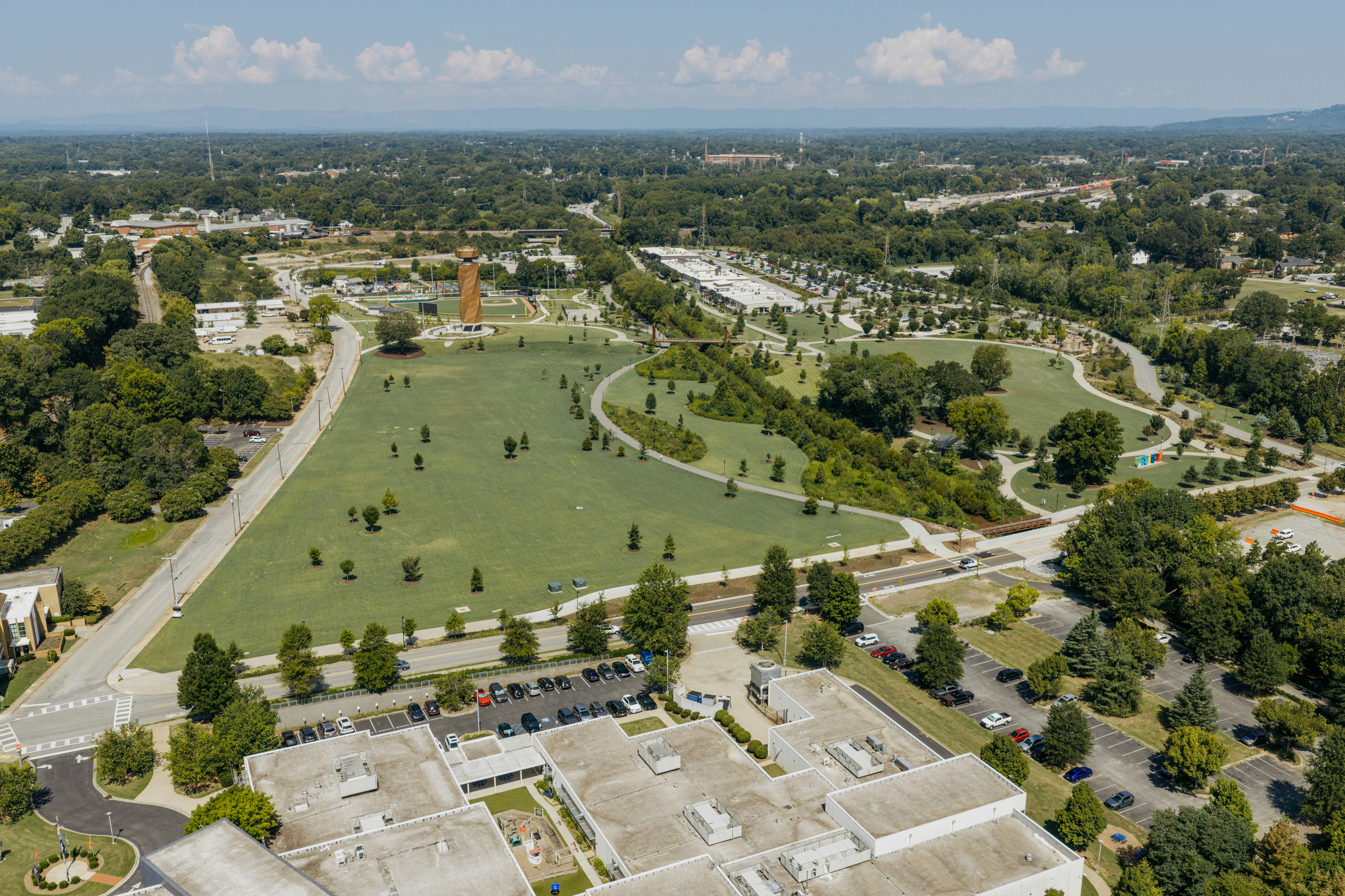 Aerial Parkland Panorama with Central Amenities and Track