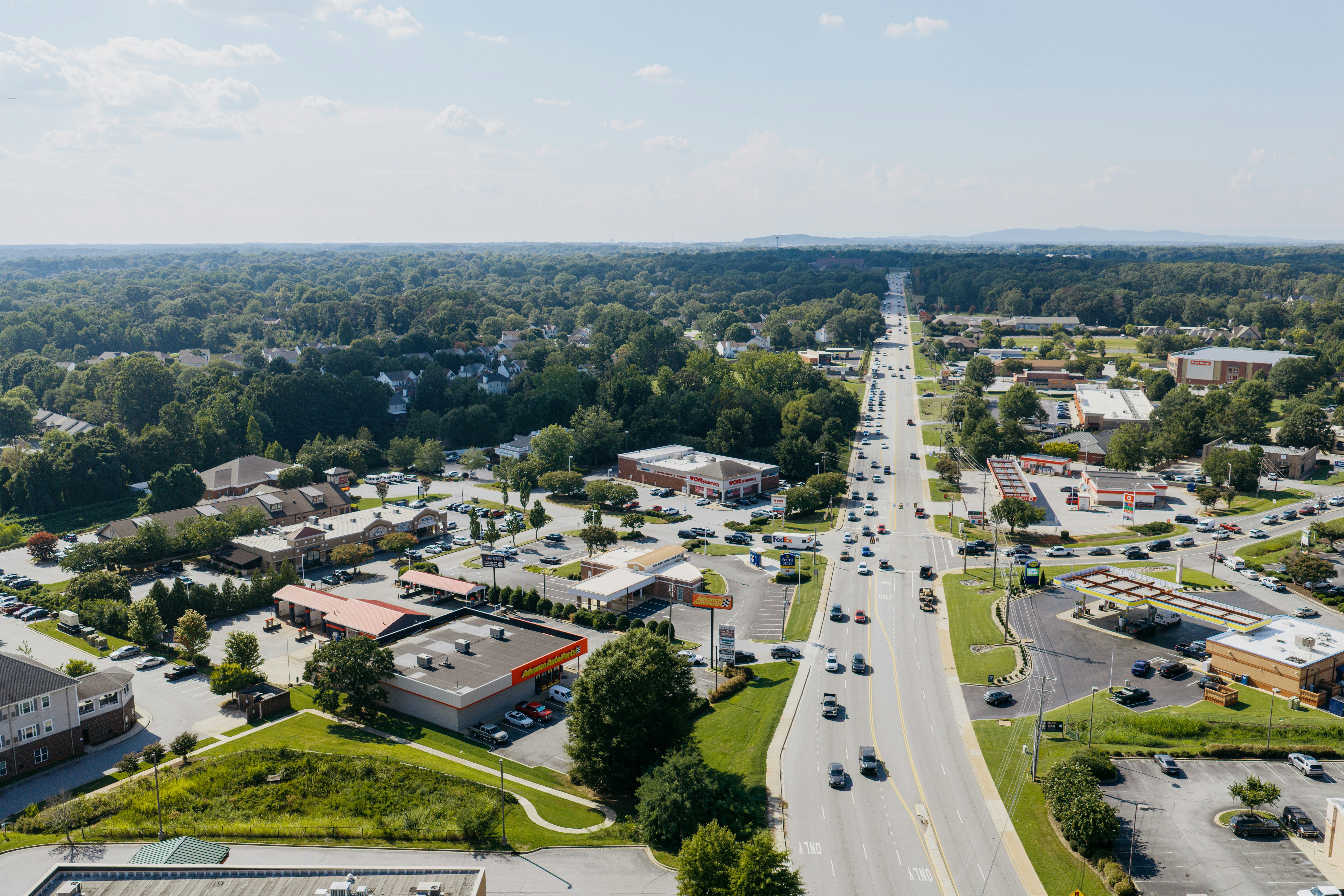 A Quiet Corridor: Suburban Spine Shedding Light on a Sunday Drive