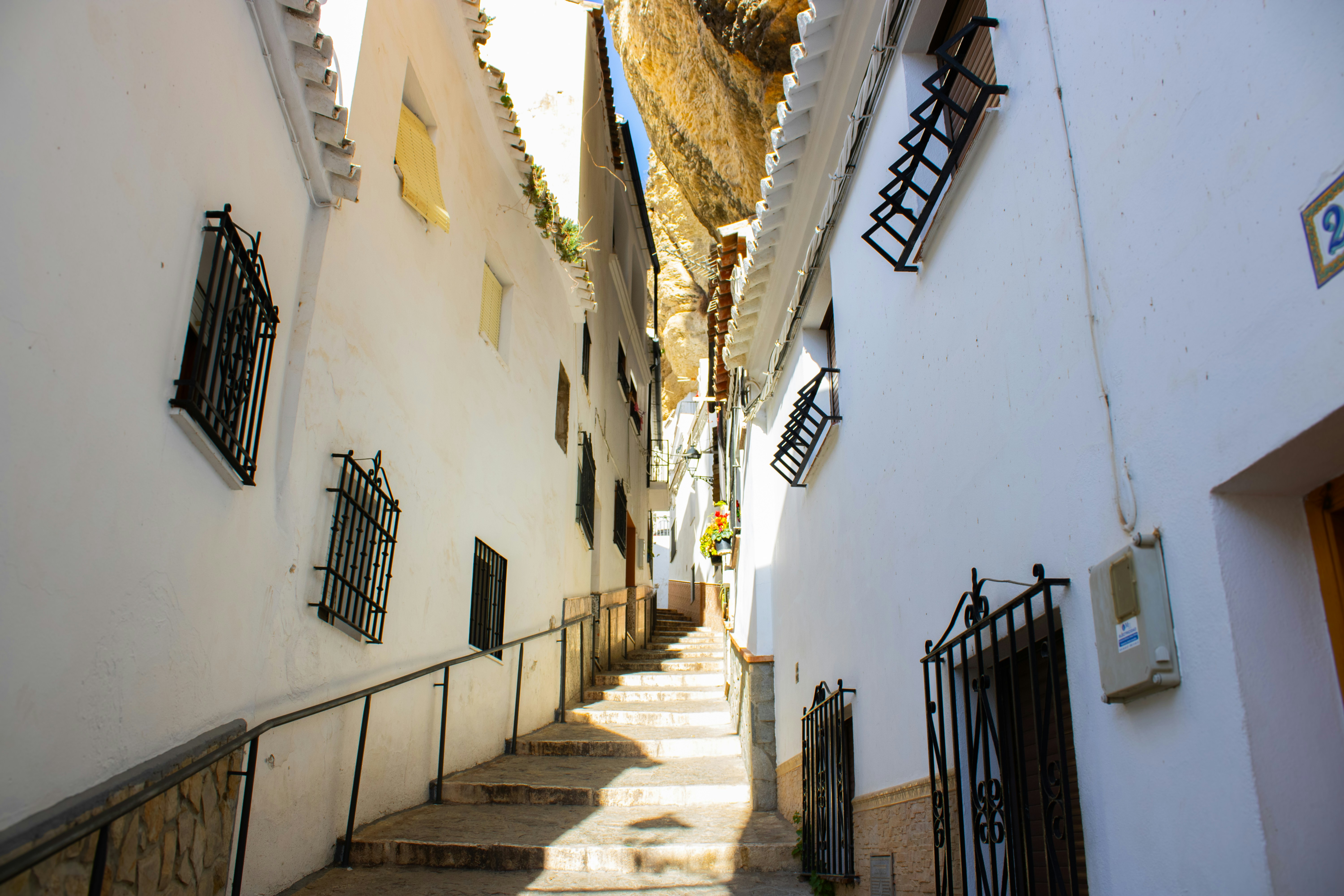 Sunlit Calle of Whitewashed Steps