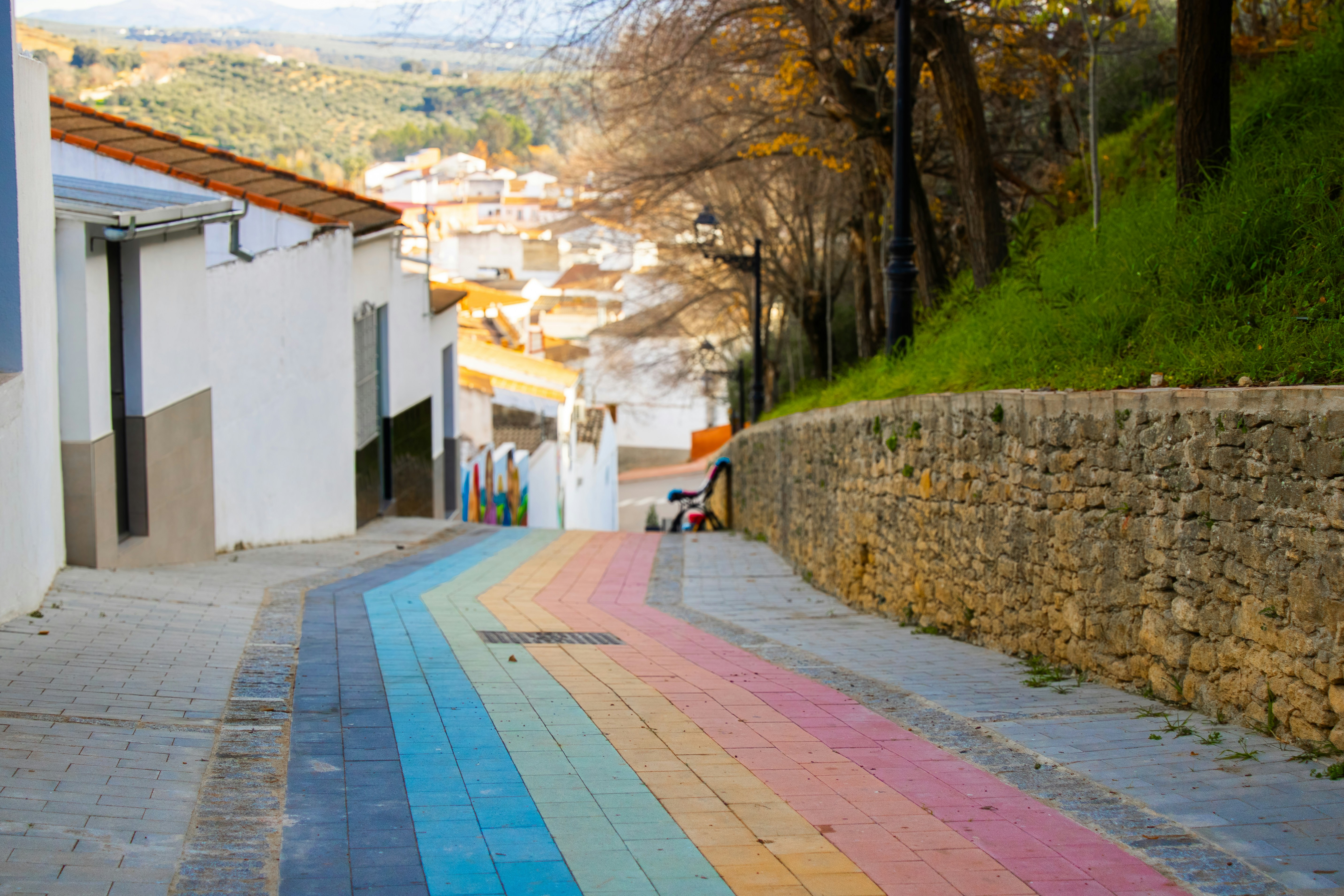Rainbow Walkway Down a Quiet Spanish Street