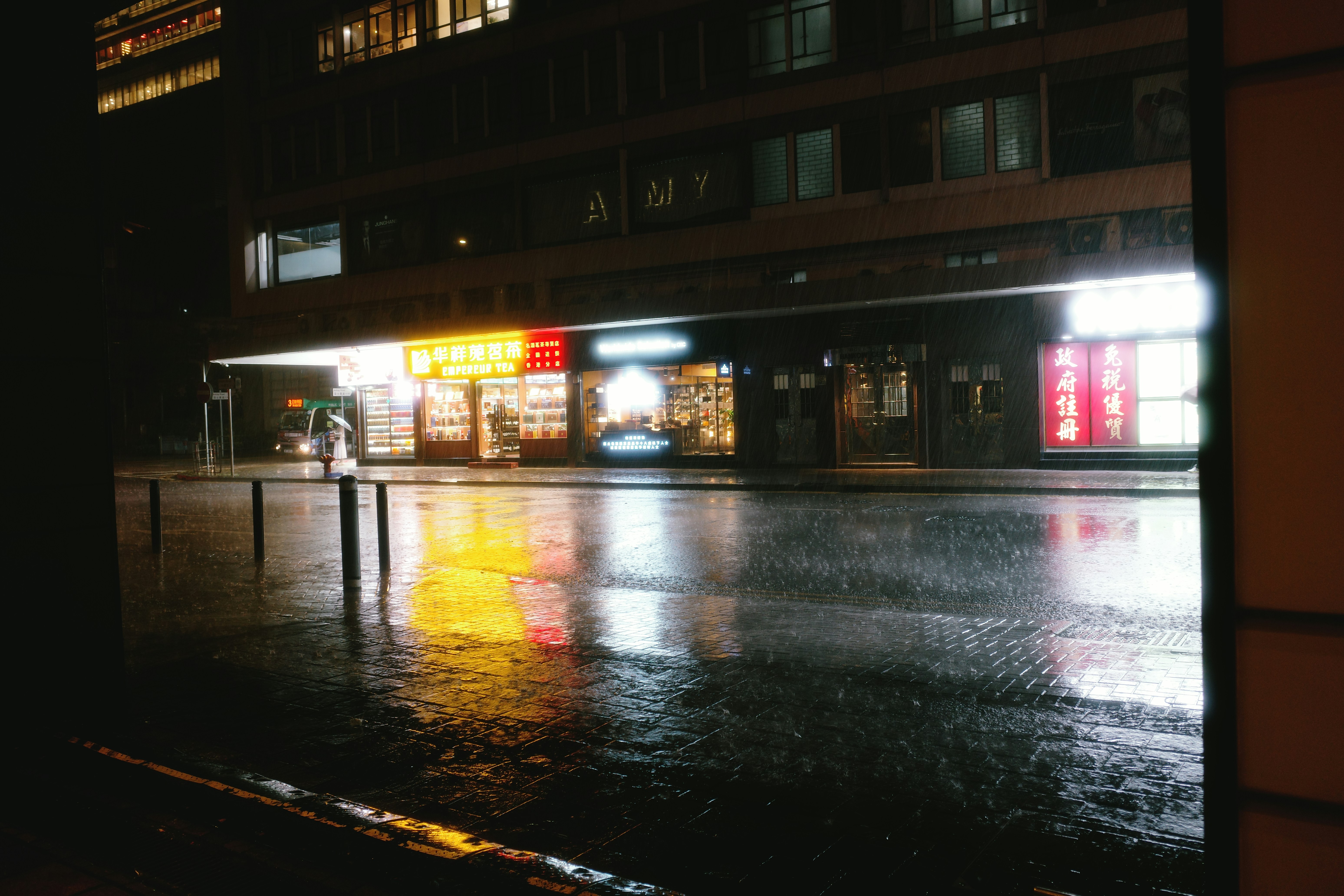 Neon Reflections on a Rainy Night Street