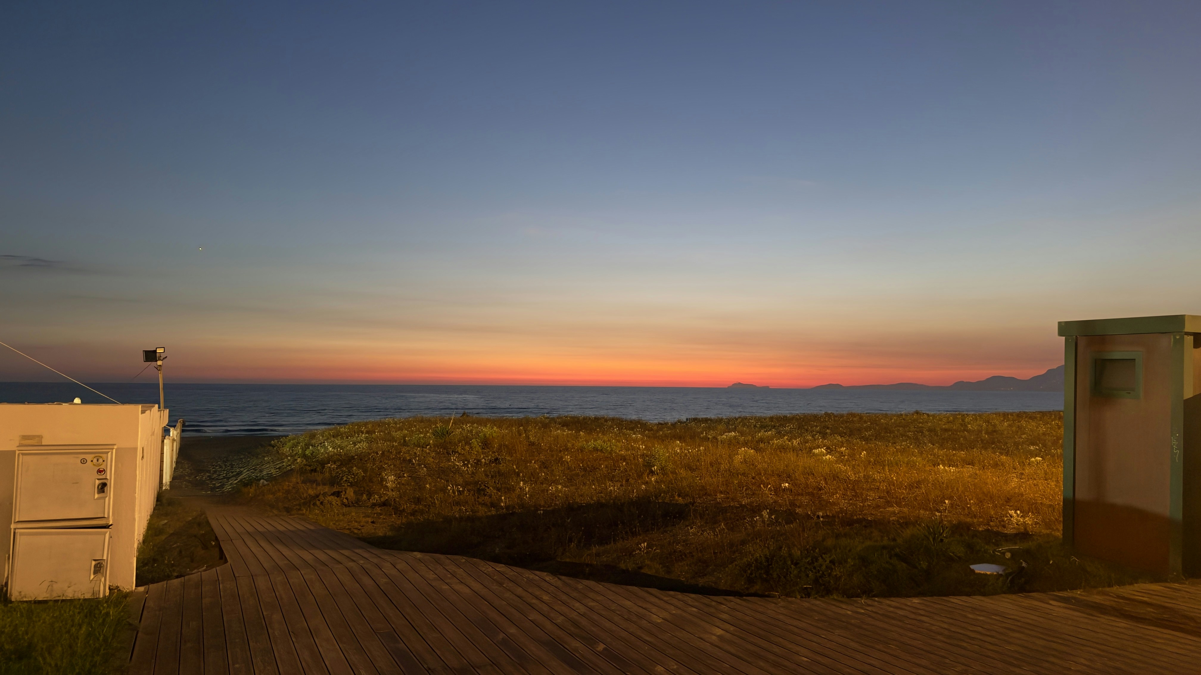 Horizon Fire: Sunset over a Quiet Coastal Path