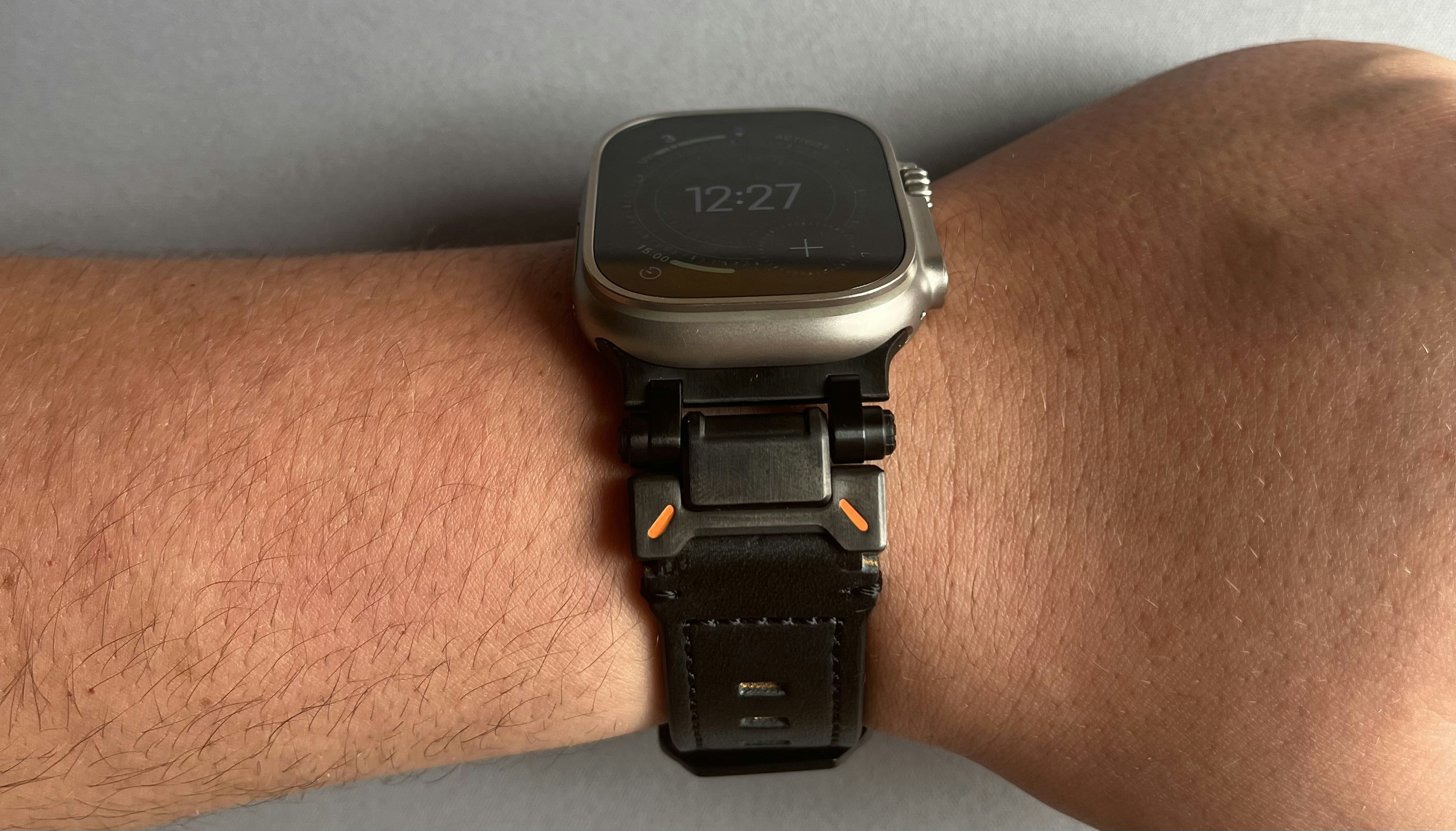 Smartwatch on a sunlit wrist: a close-up of wearable tech