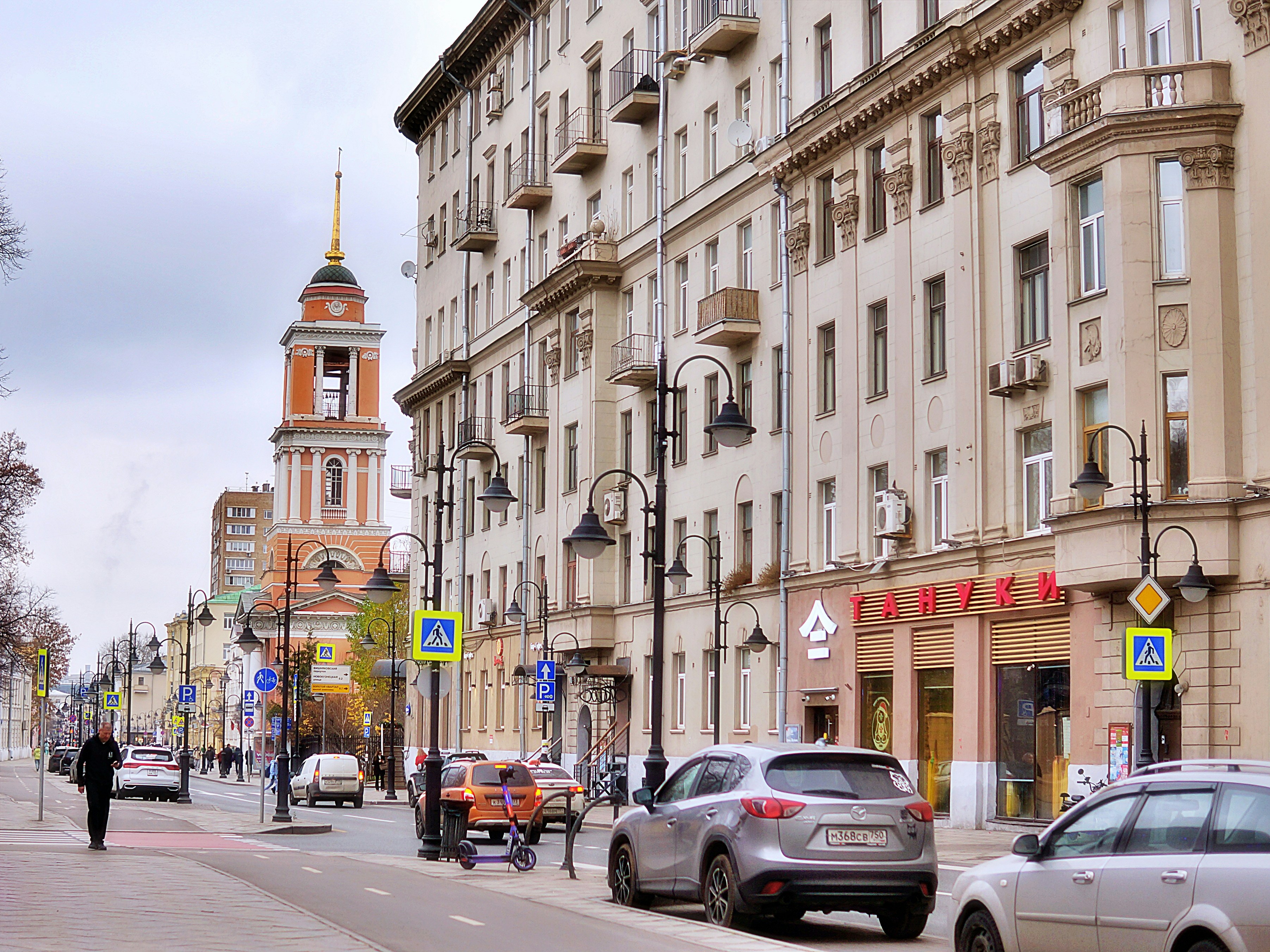 Streetside Clocktower: Urban Rhythm and Crosswalk Signals