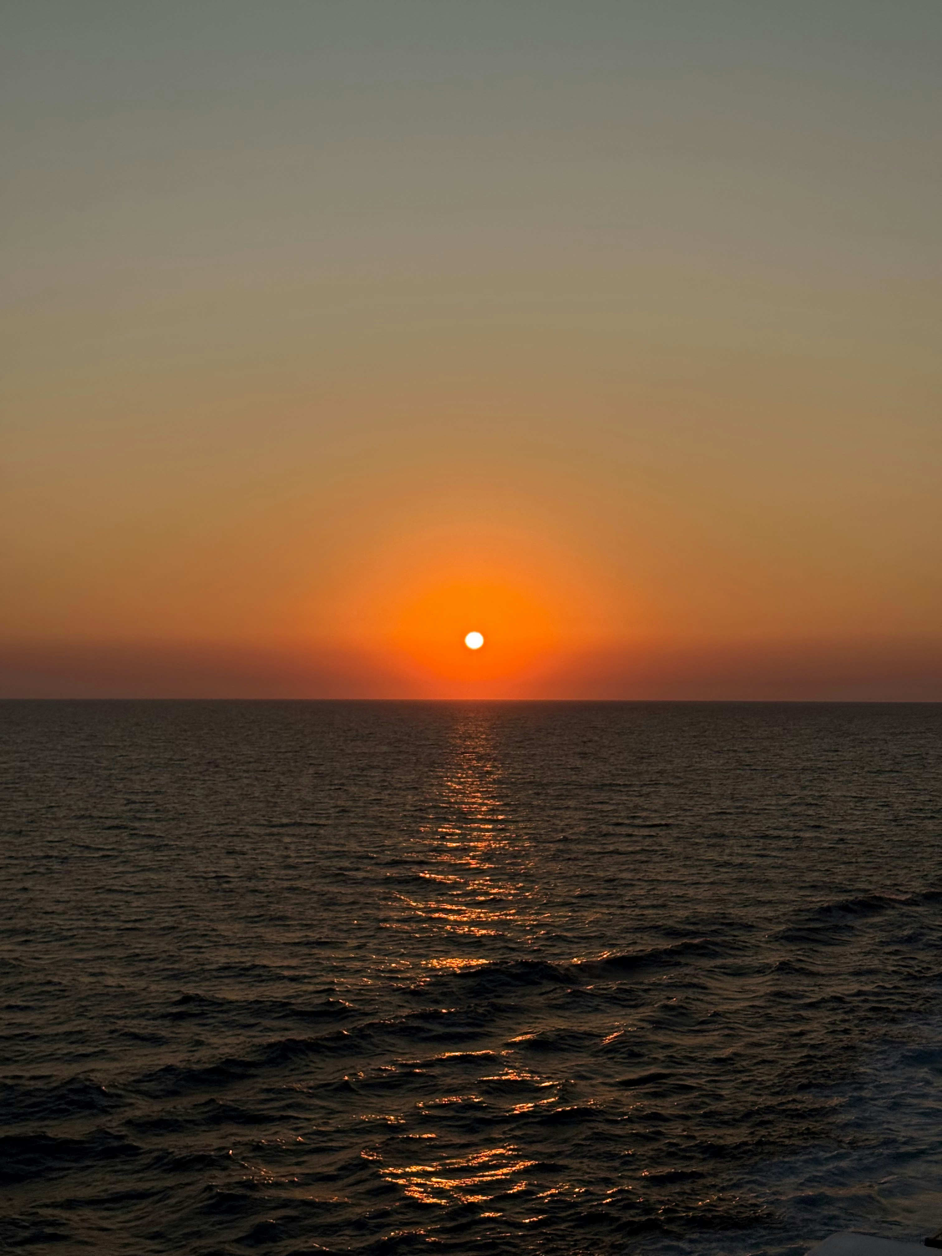 Solitary Sun on a Quiet Sea