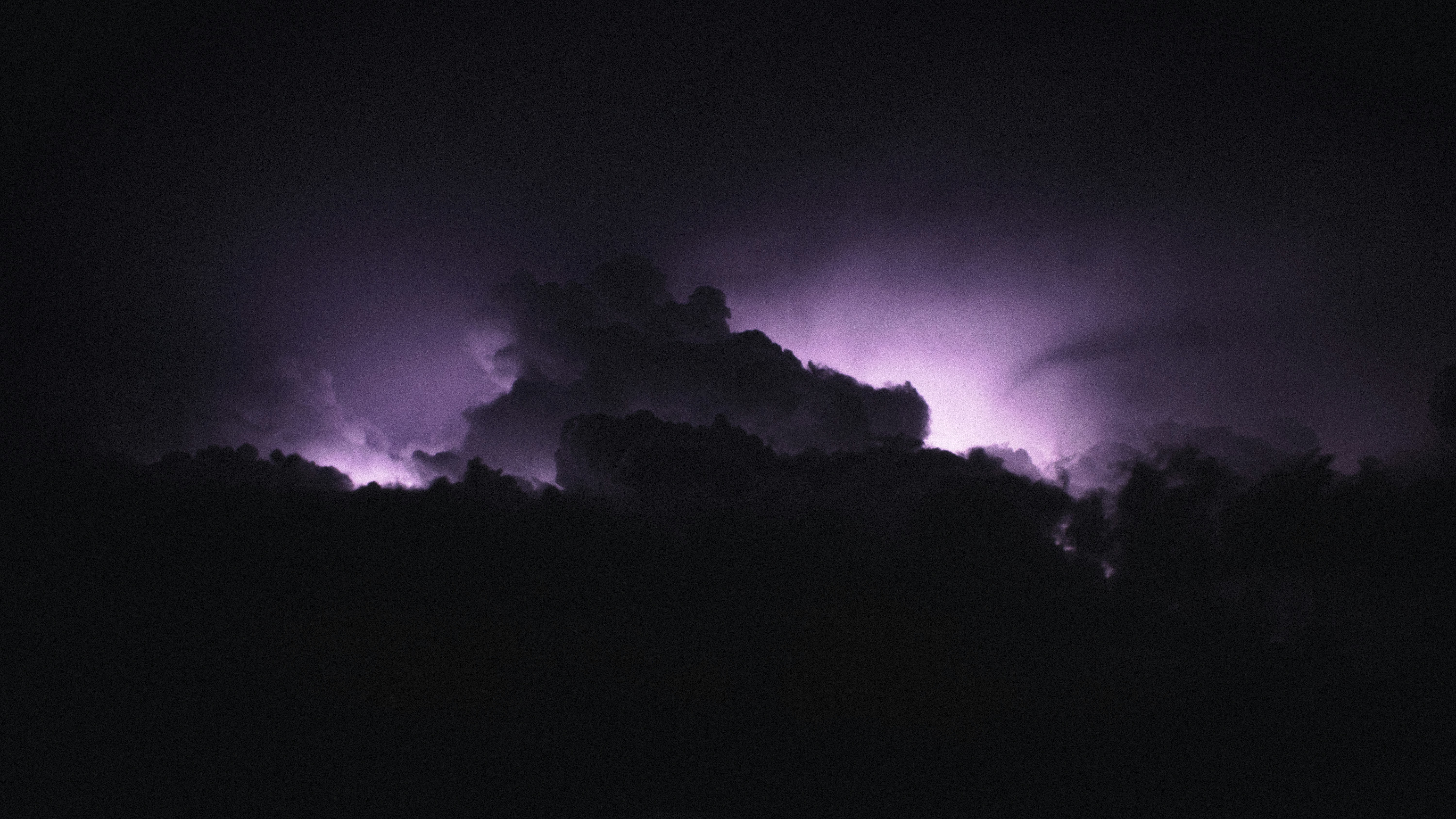 Purple Lightning Crown Over a Dark Horizon