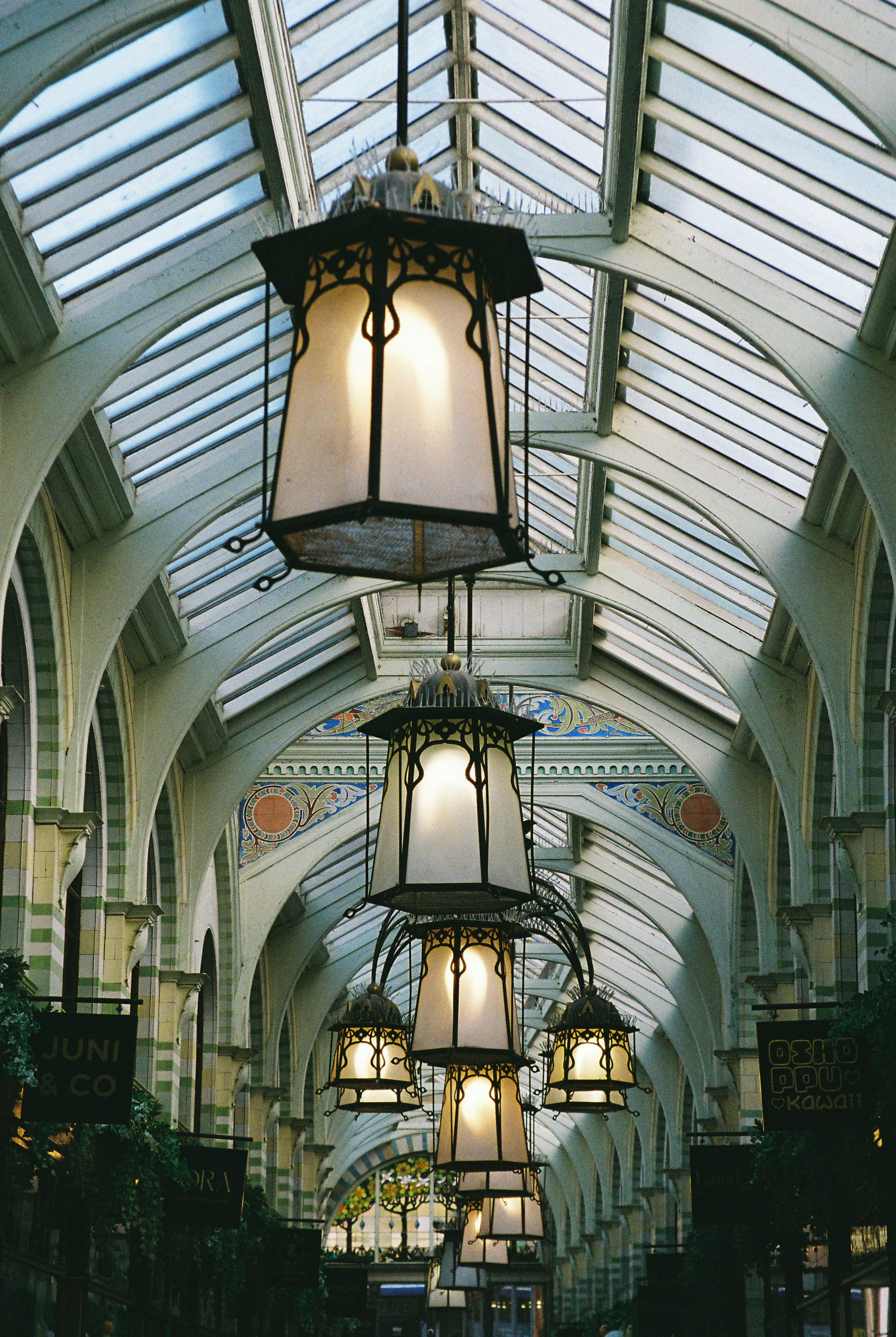 Hanging Lanterns in a Glass-arched Arcade