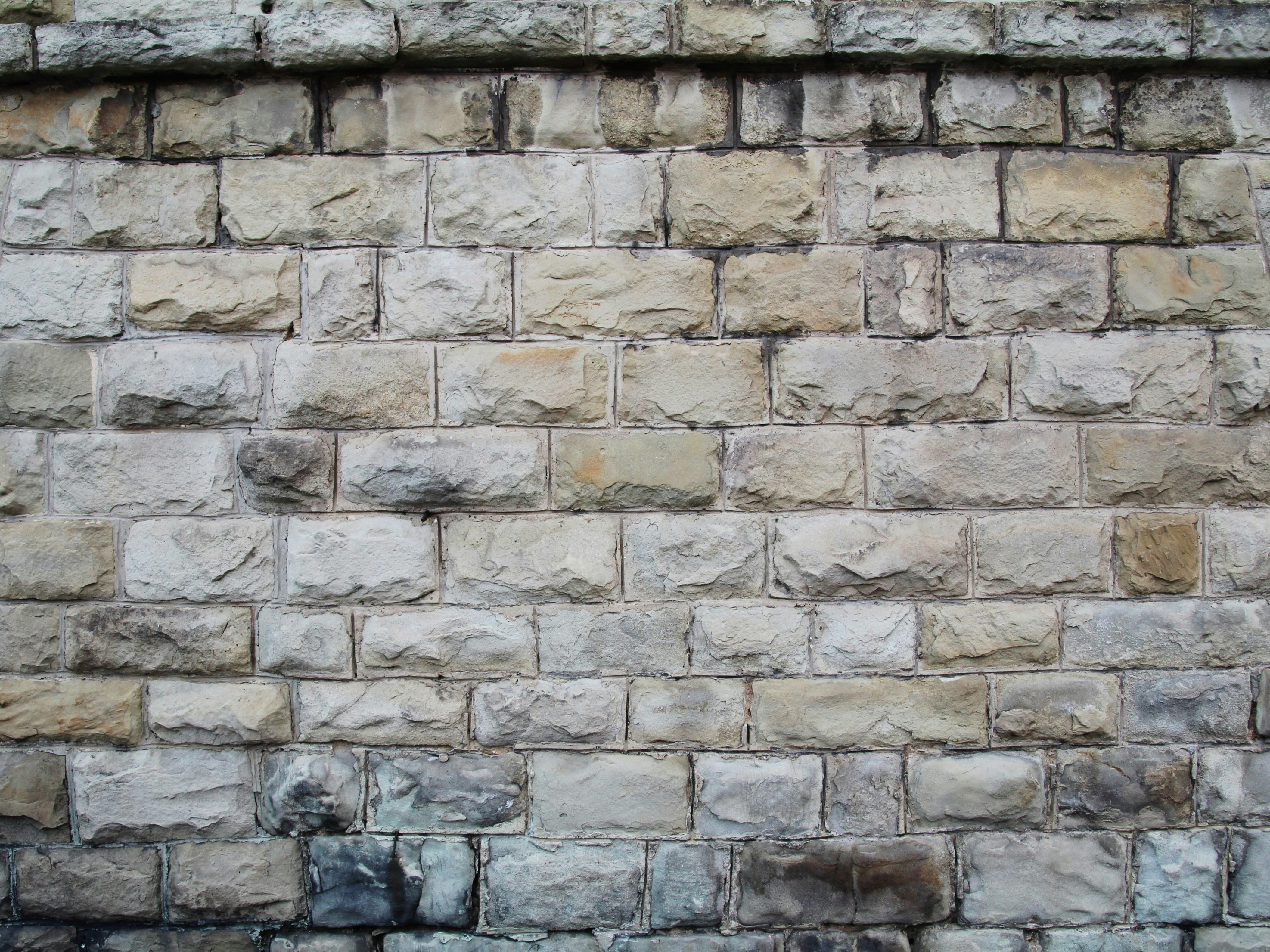 Weathered Brickwork: Quiet Edges of a Sunlit Wall