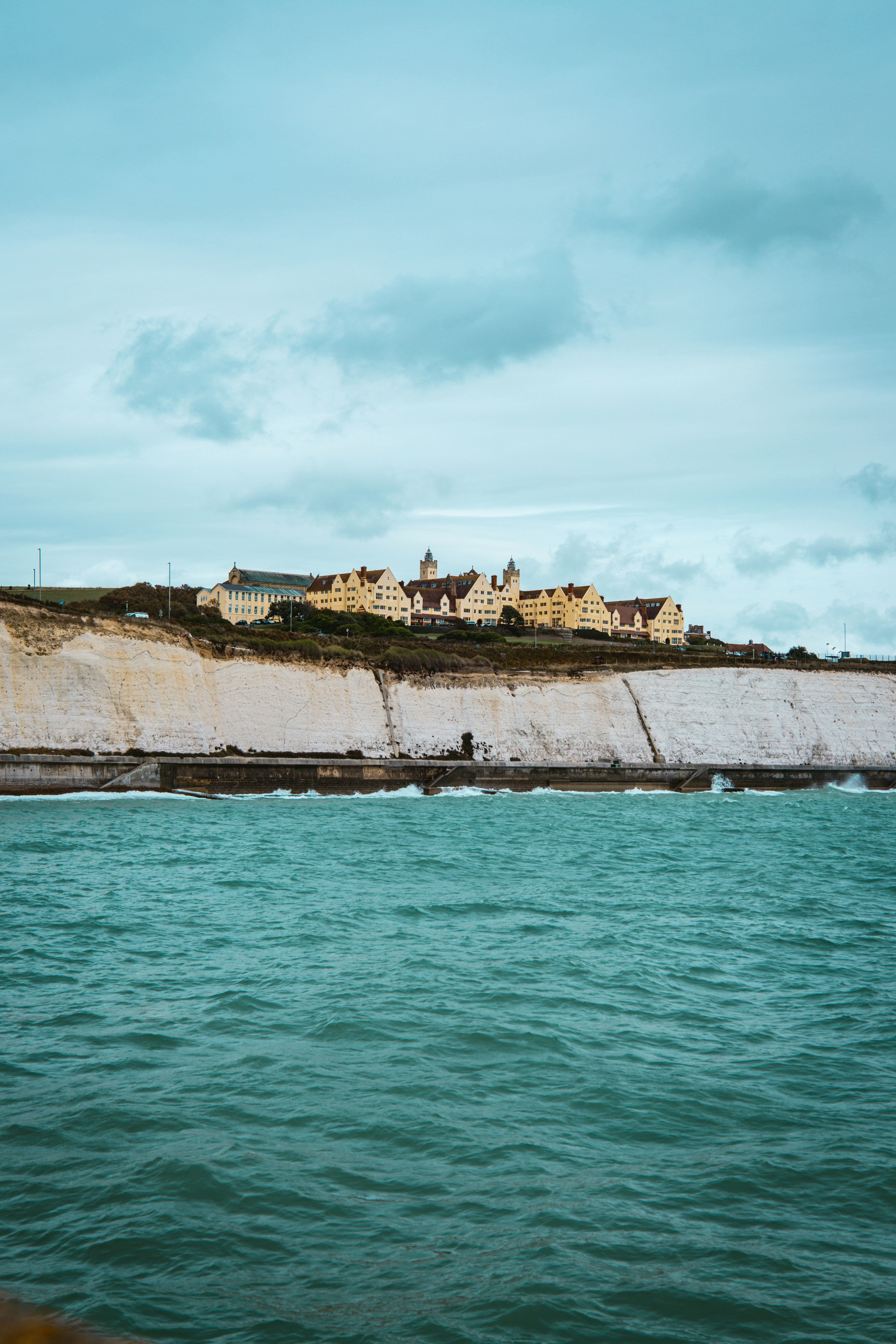 Cliffside Village Under a Wide Sea Sky