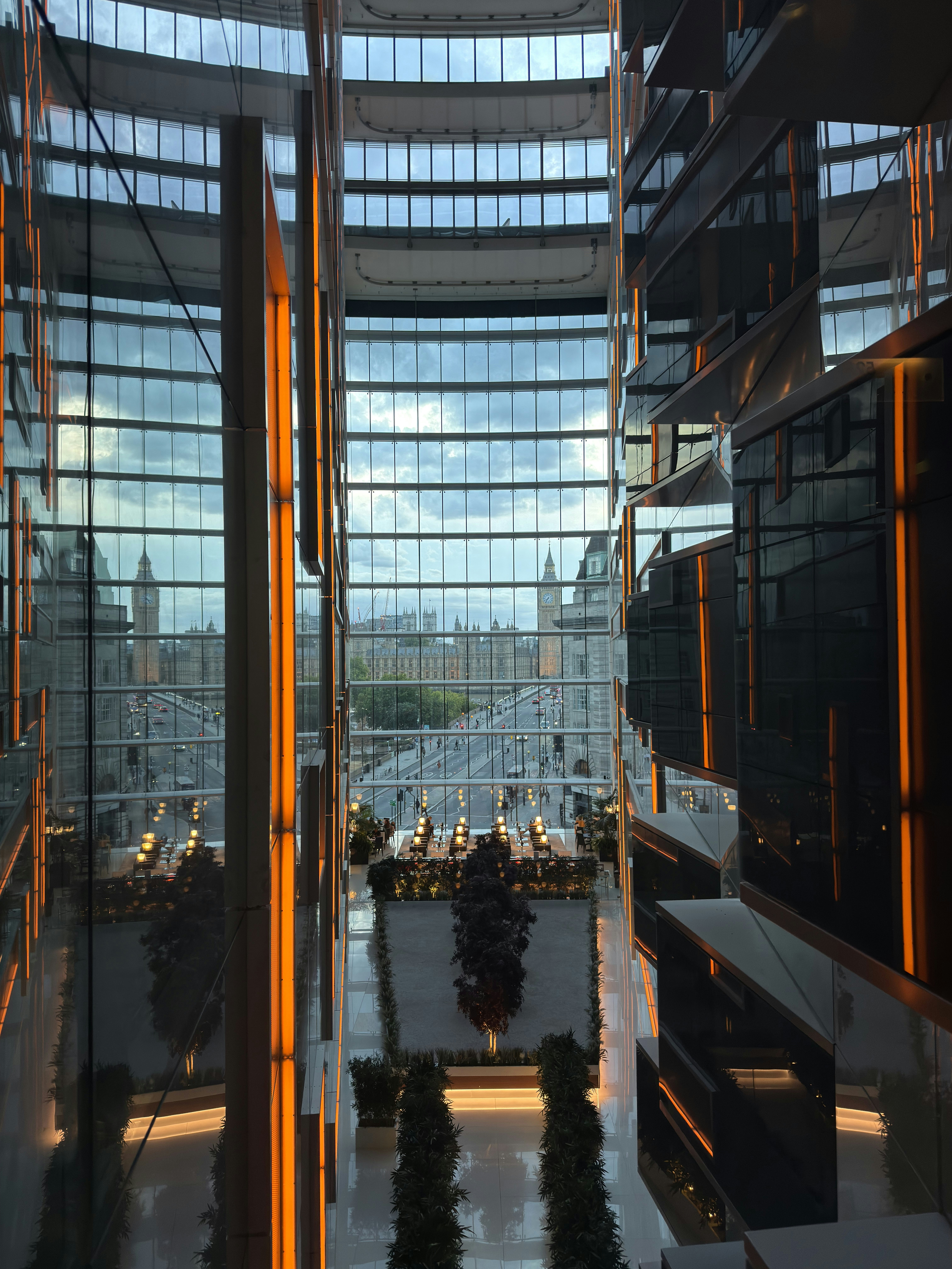 Through the Glass Atrium: Echoes of Steel and Sunset Light