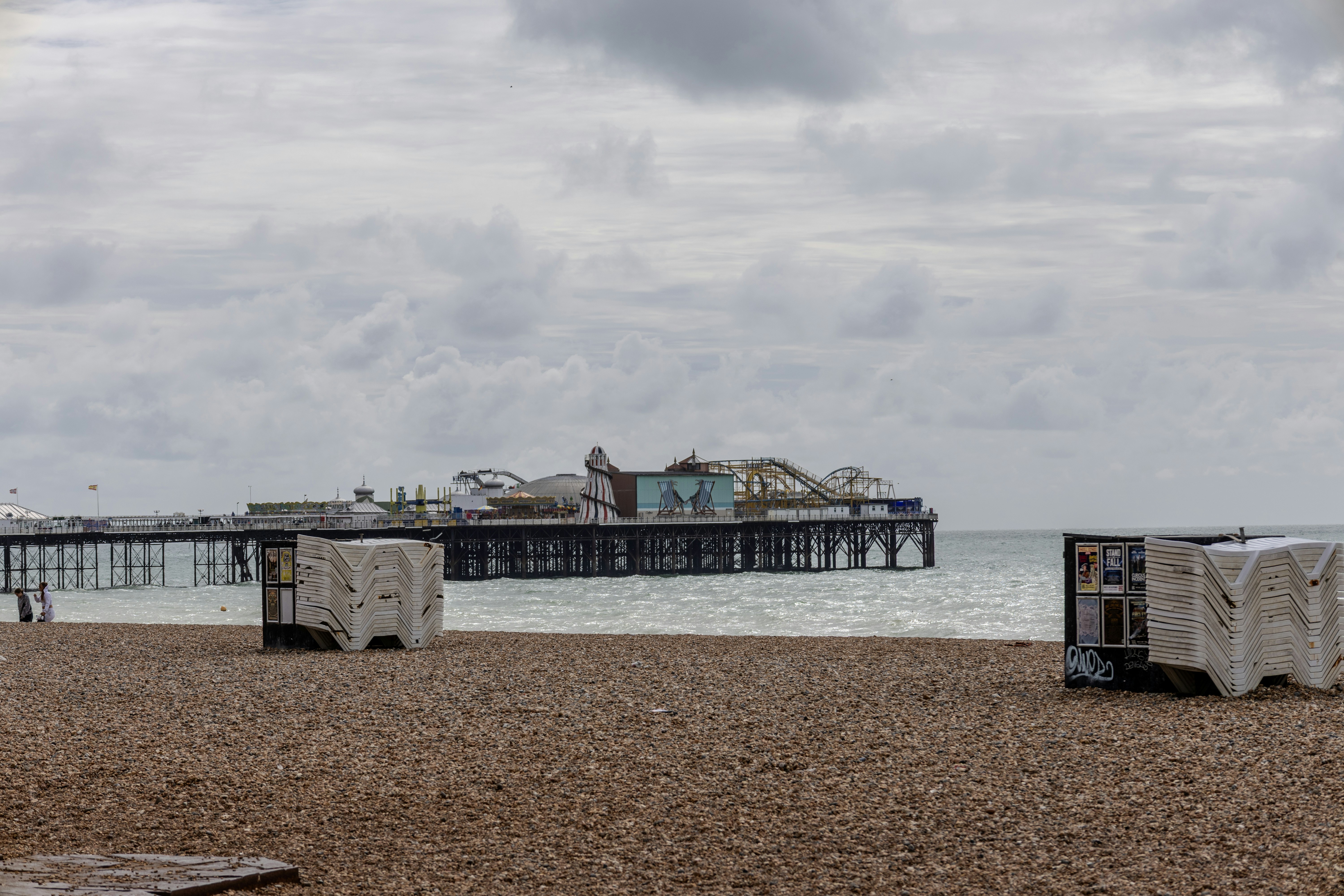 Pierline and Beachwide: A Quiet Seaside Pier in Distant Breakwater