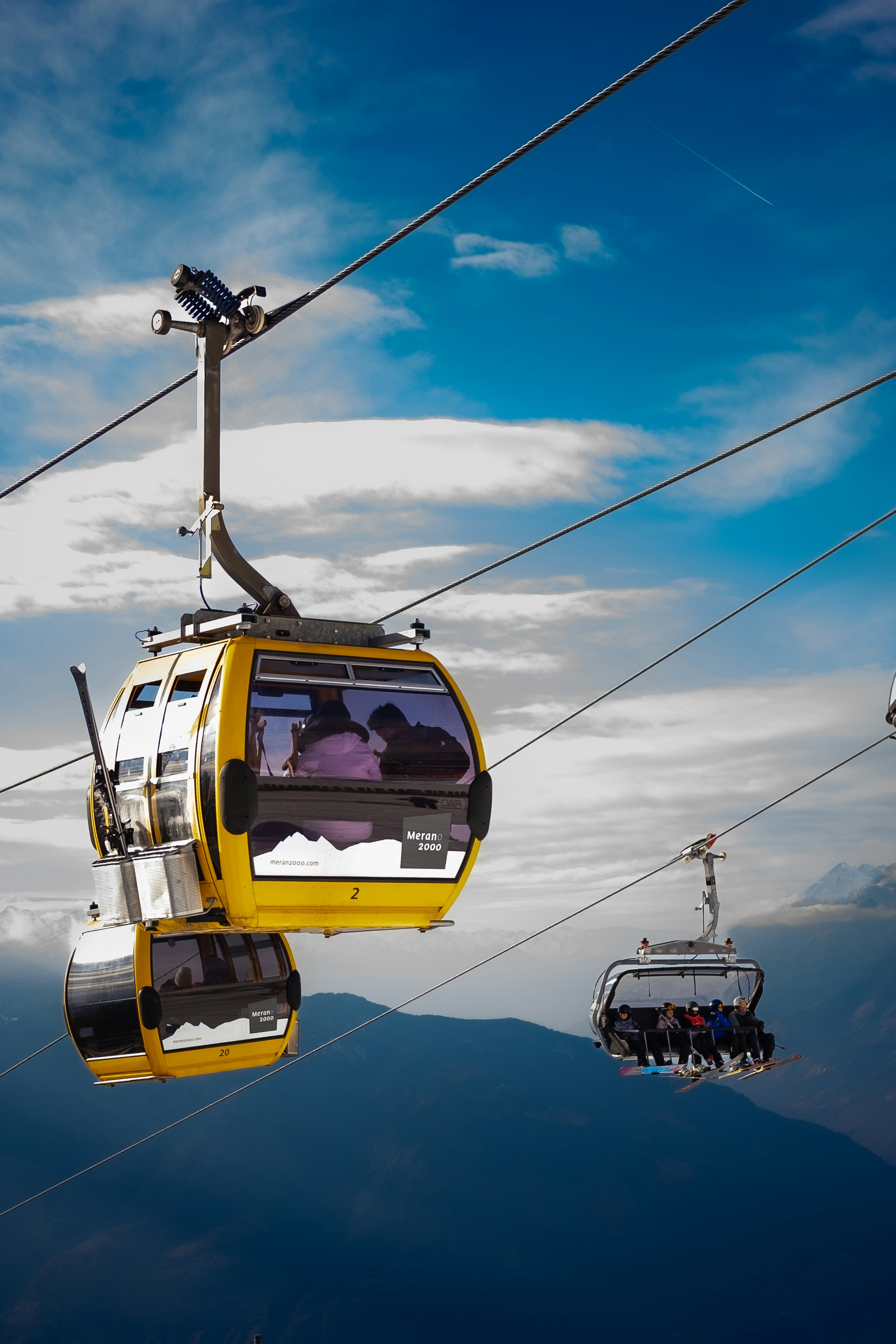 Yellow Gondola in the Sky: A High-Altitude Cable Car Ride