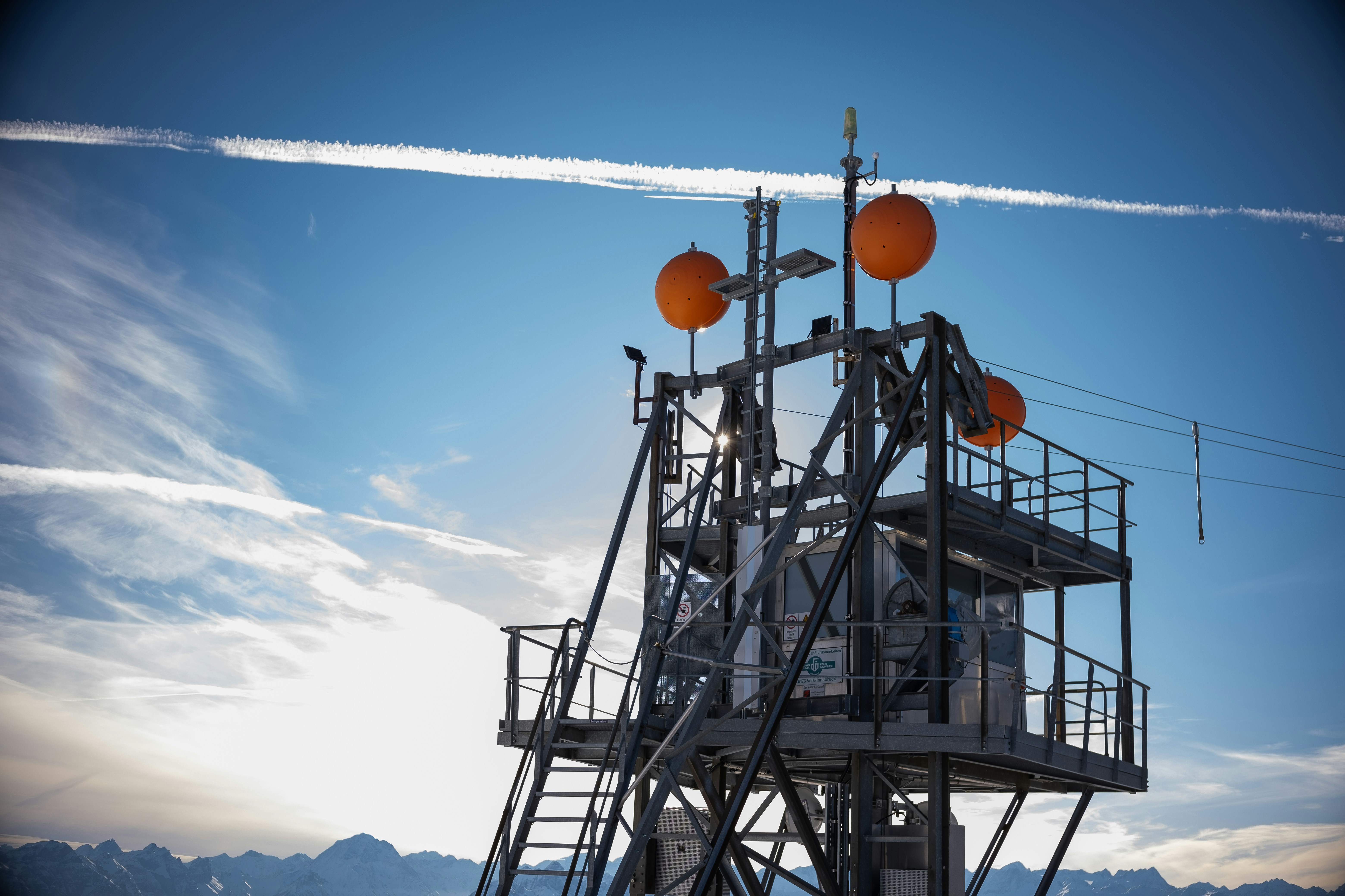 Limbed tower against a crisp alpine sky