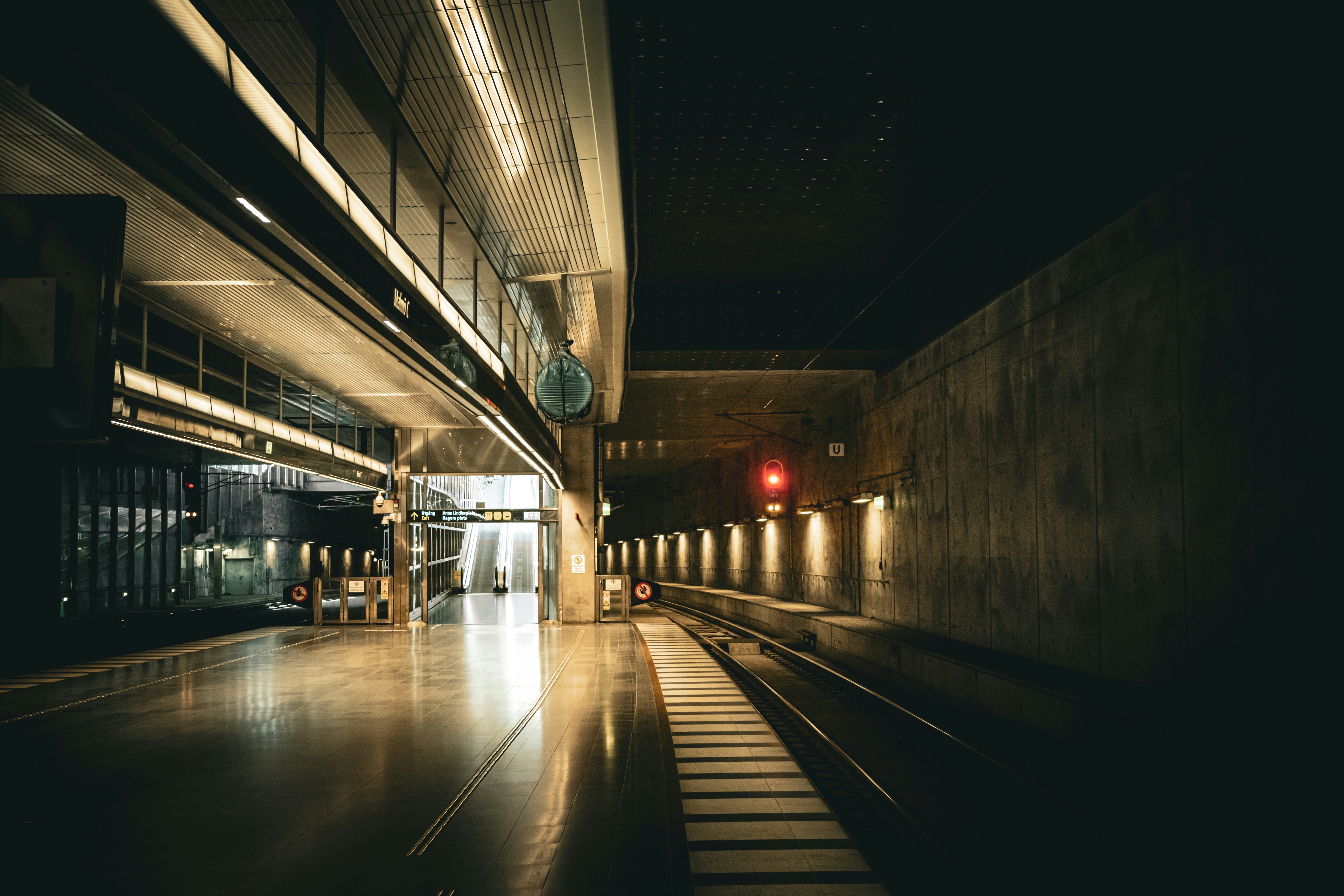 Midnight Transit: Quiet Platform Beneath Neon Rails
