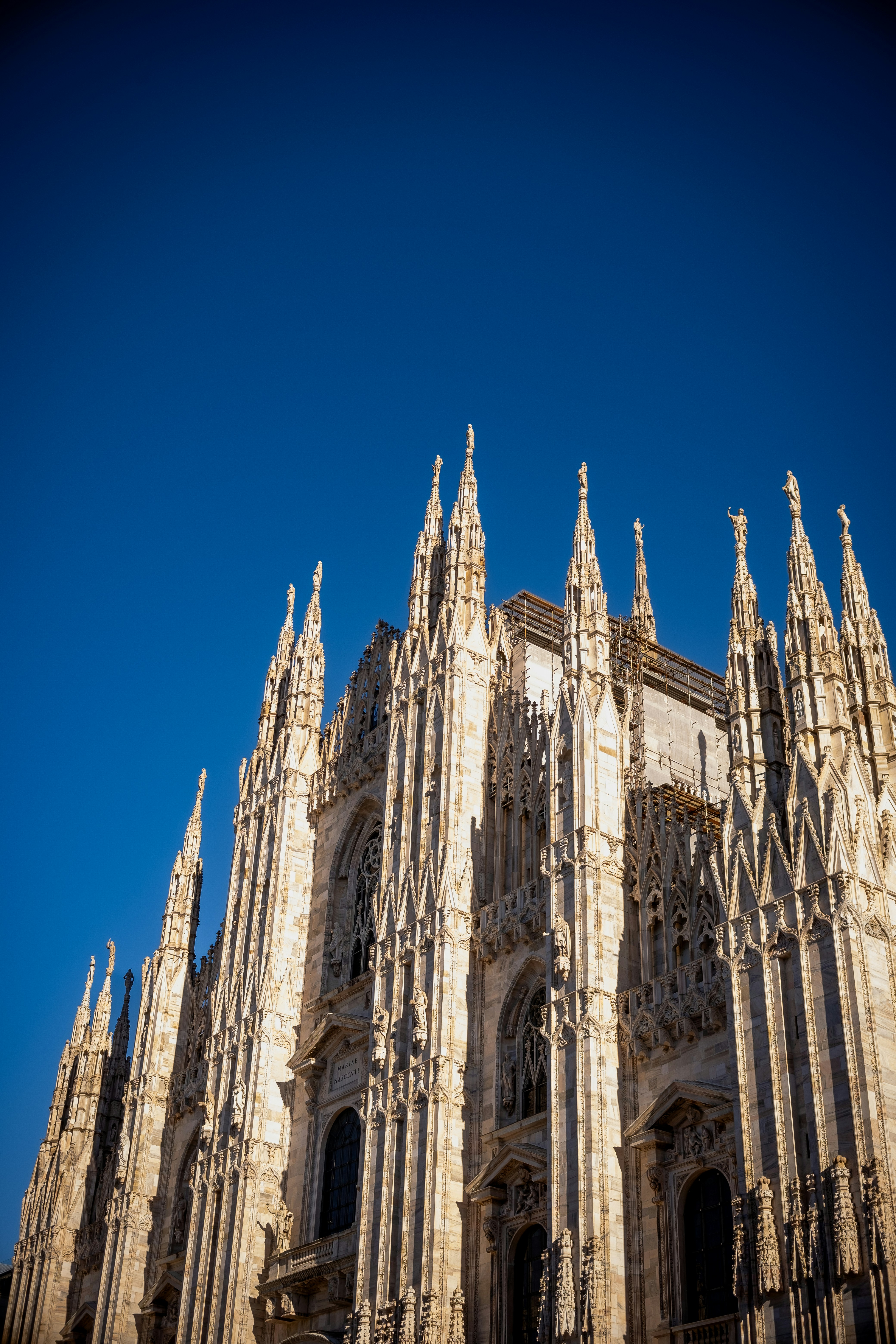 Gothic Cathedral Spires Reaching Toward a Clear Blue Sky