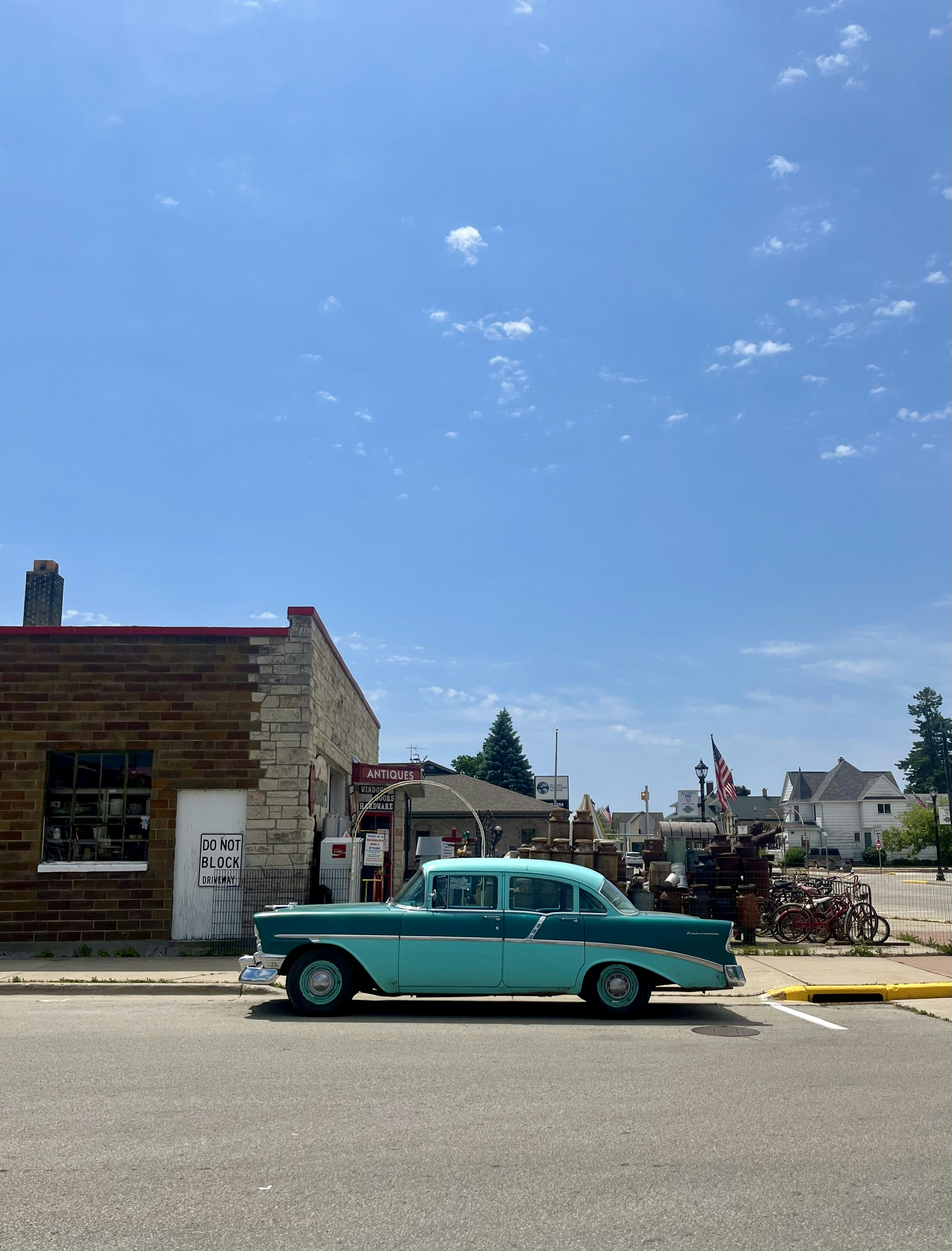 Turquoise classic on a sunlit main street
