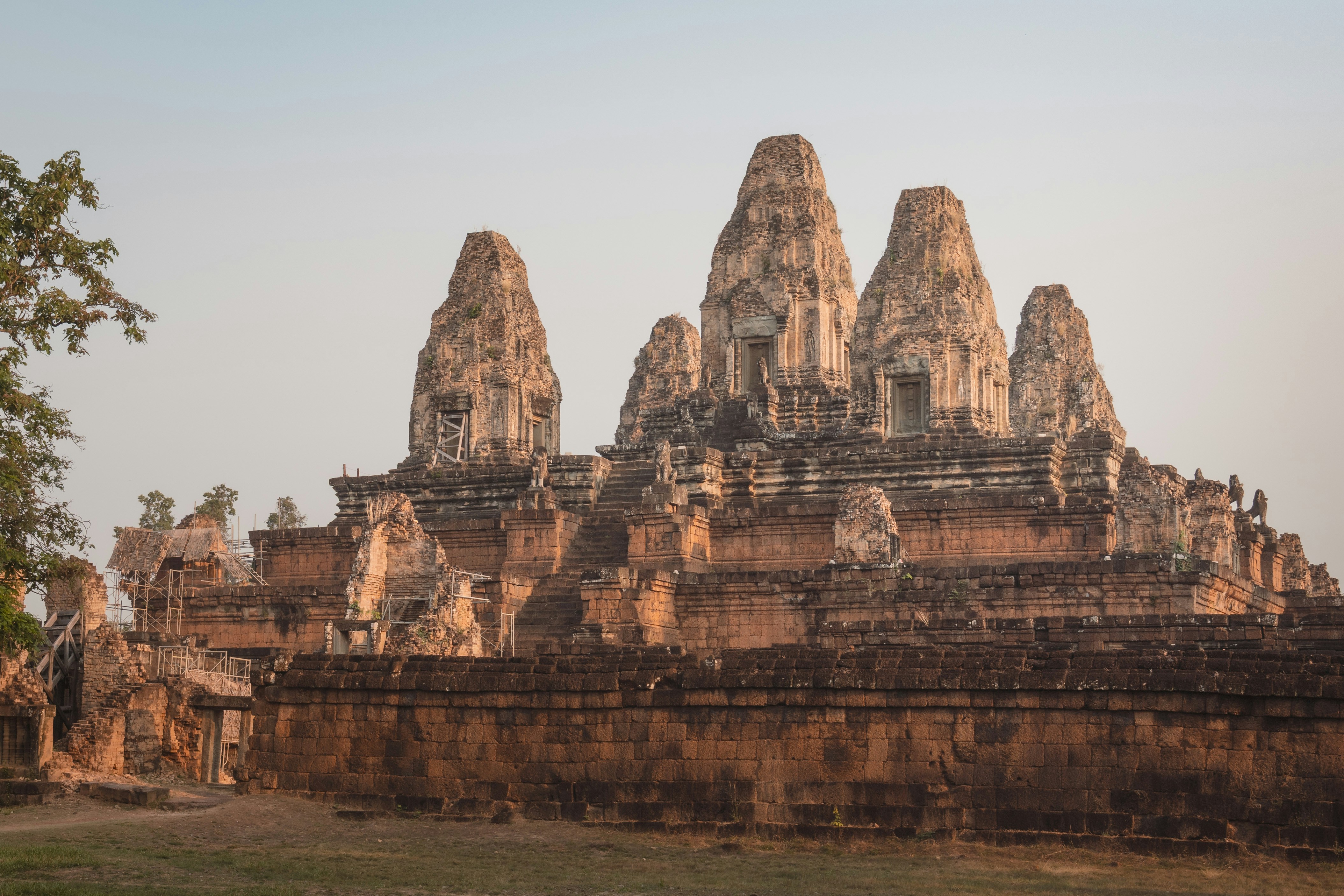 Temple Towers Rising: Sunset Over Angkor Wat's Ancient Citadel