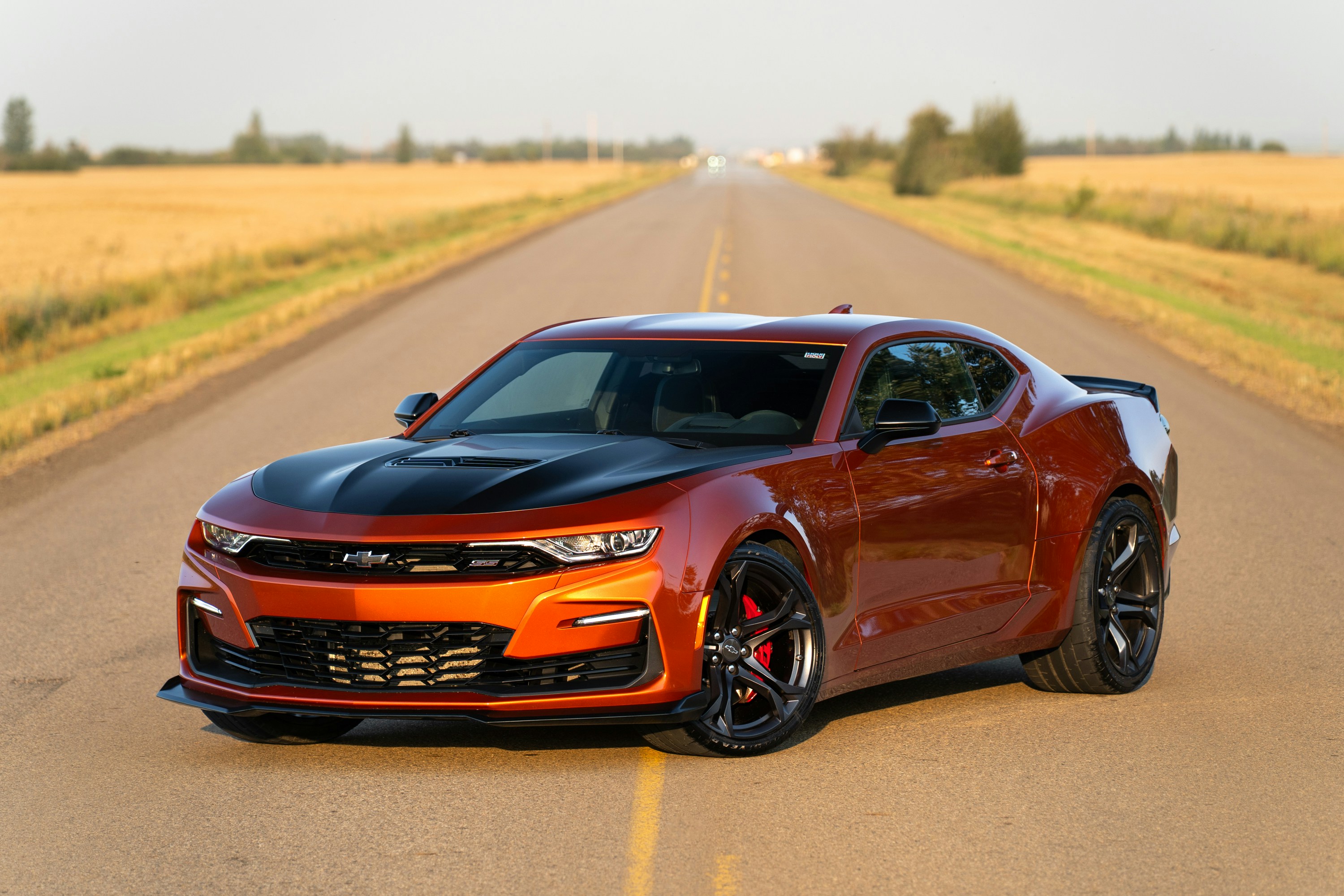 Scarlet on the Open Road: A Bold Muscle Car Stands Central