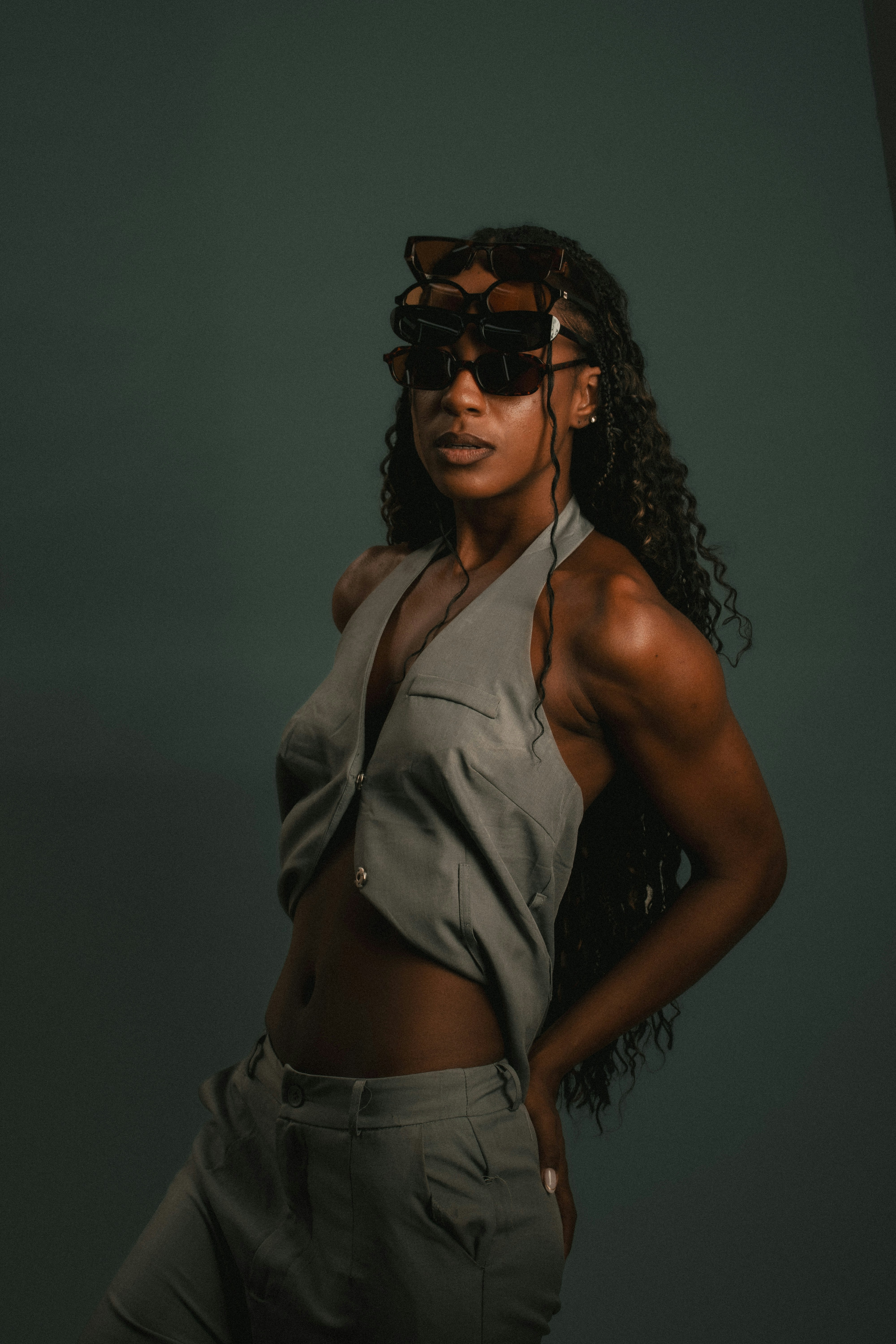 Shadowed Grace: a poised portrait in moody studio light