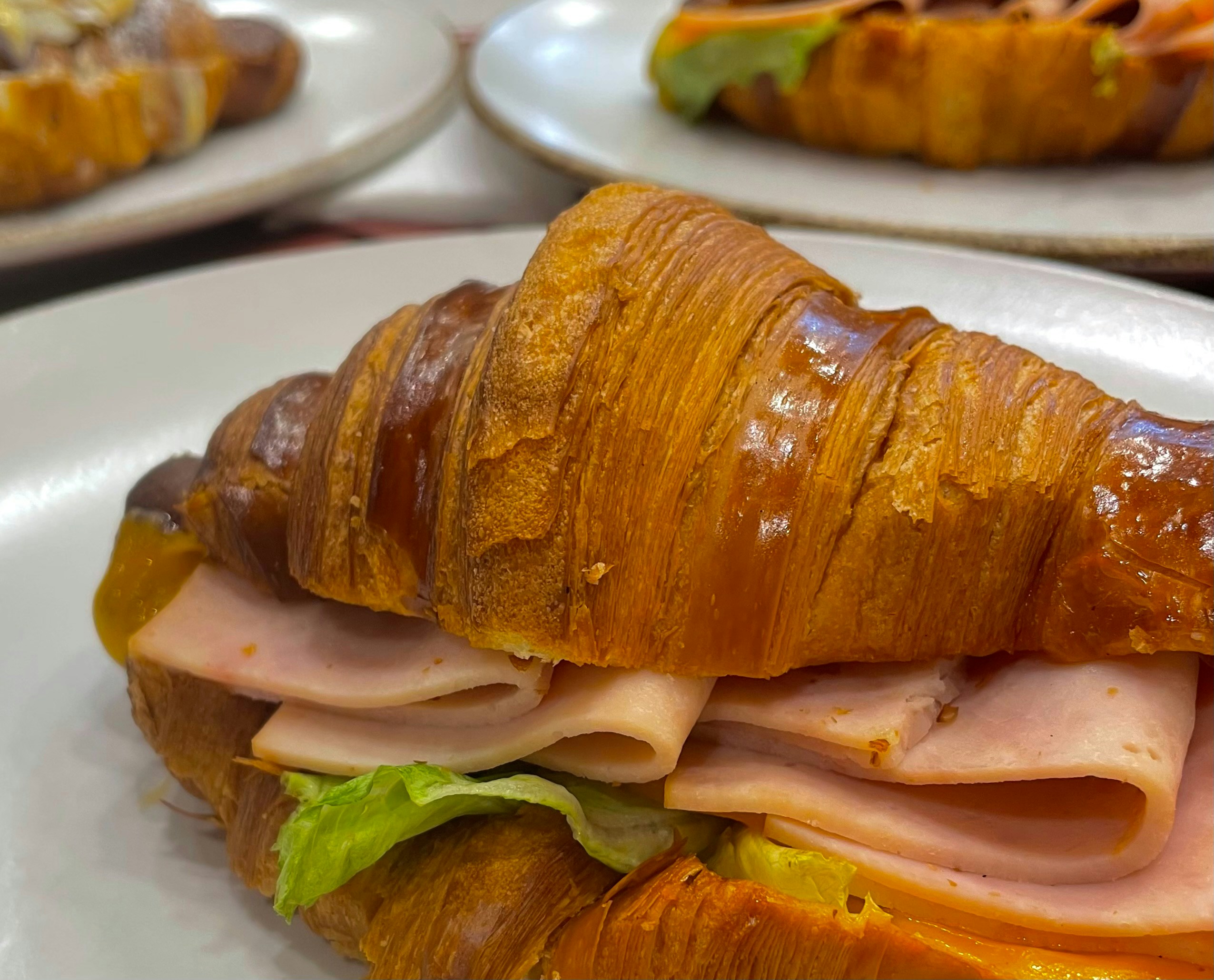 Golden Crescent: Ham and Lettuce Croissant Sandwich