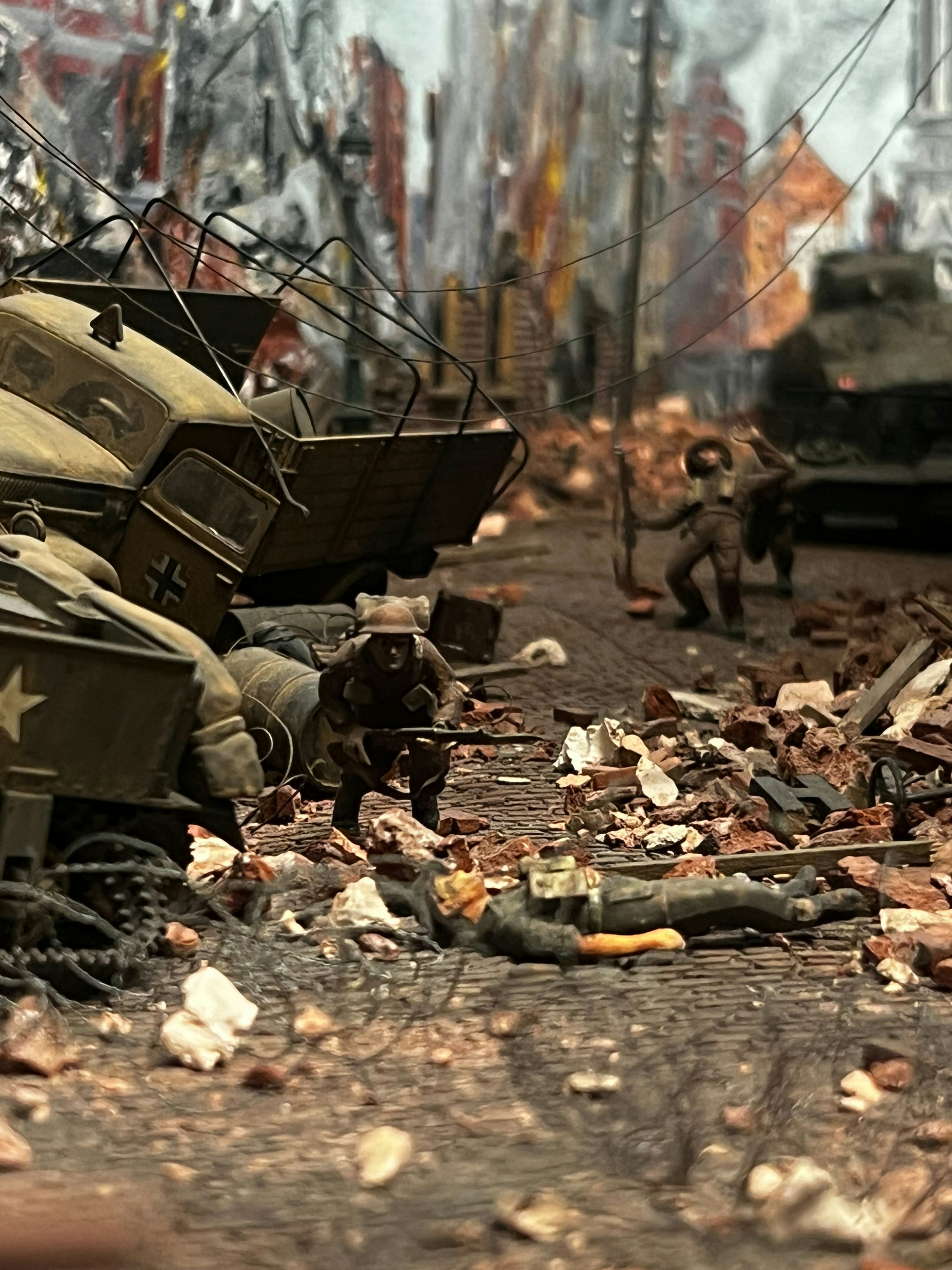 Ruins of the Battlefield: Tiny Figures amid Fallen Steel
