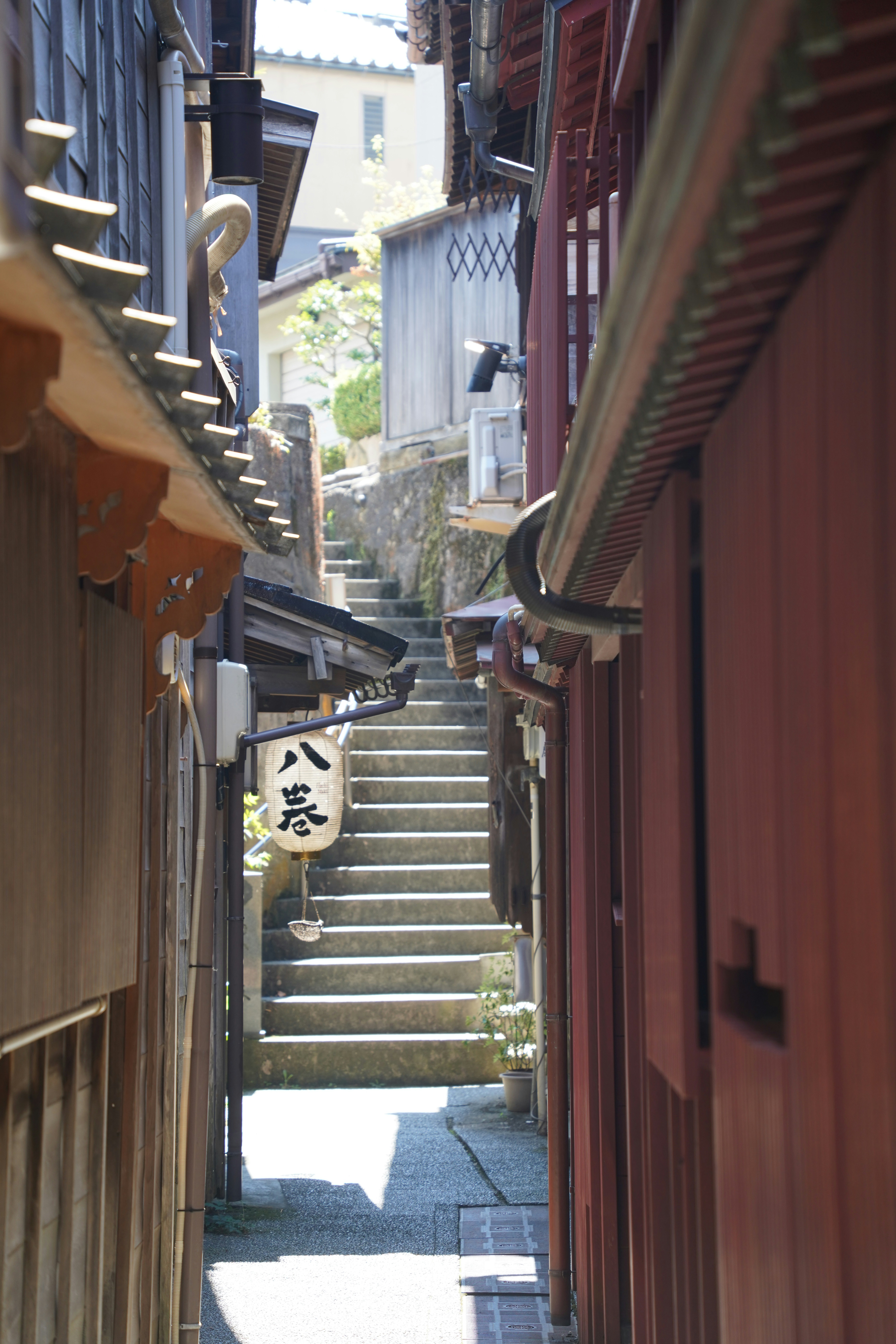 Lantern at the Steps: A Quiet Alley Between Traditional Facades
