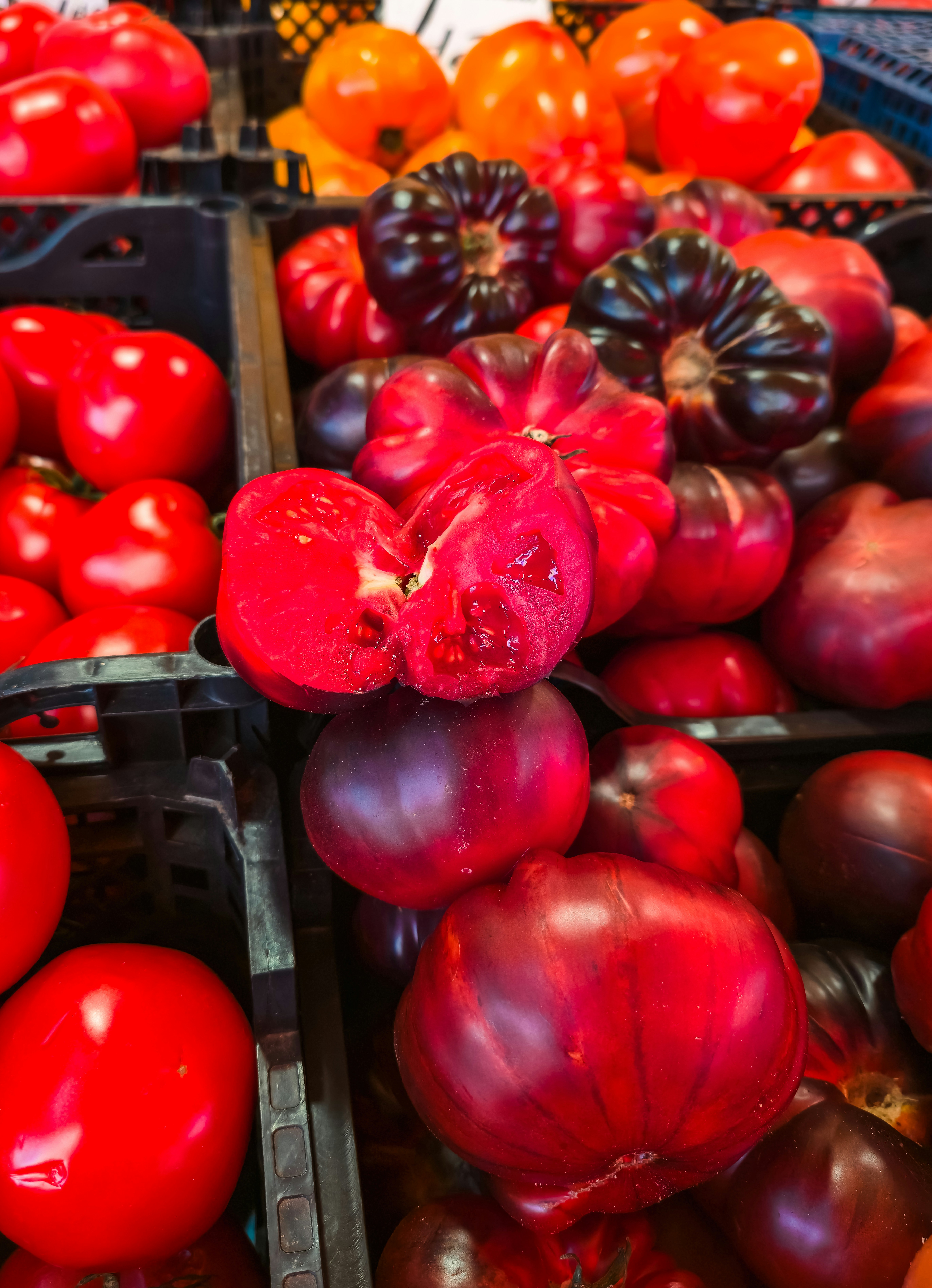 Split-Seeded Scarlet: A Stack of Heirloom Tomatoes in Rich Palette