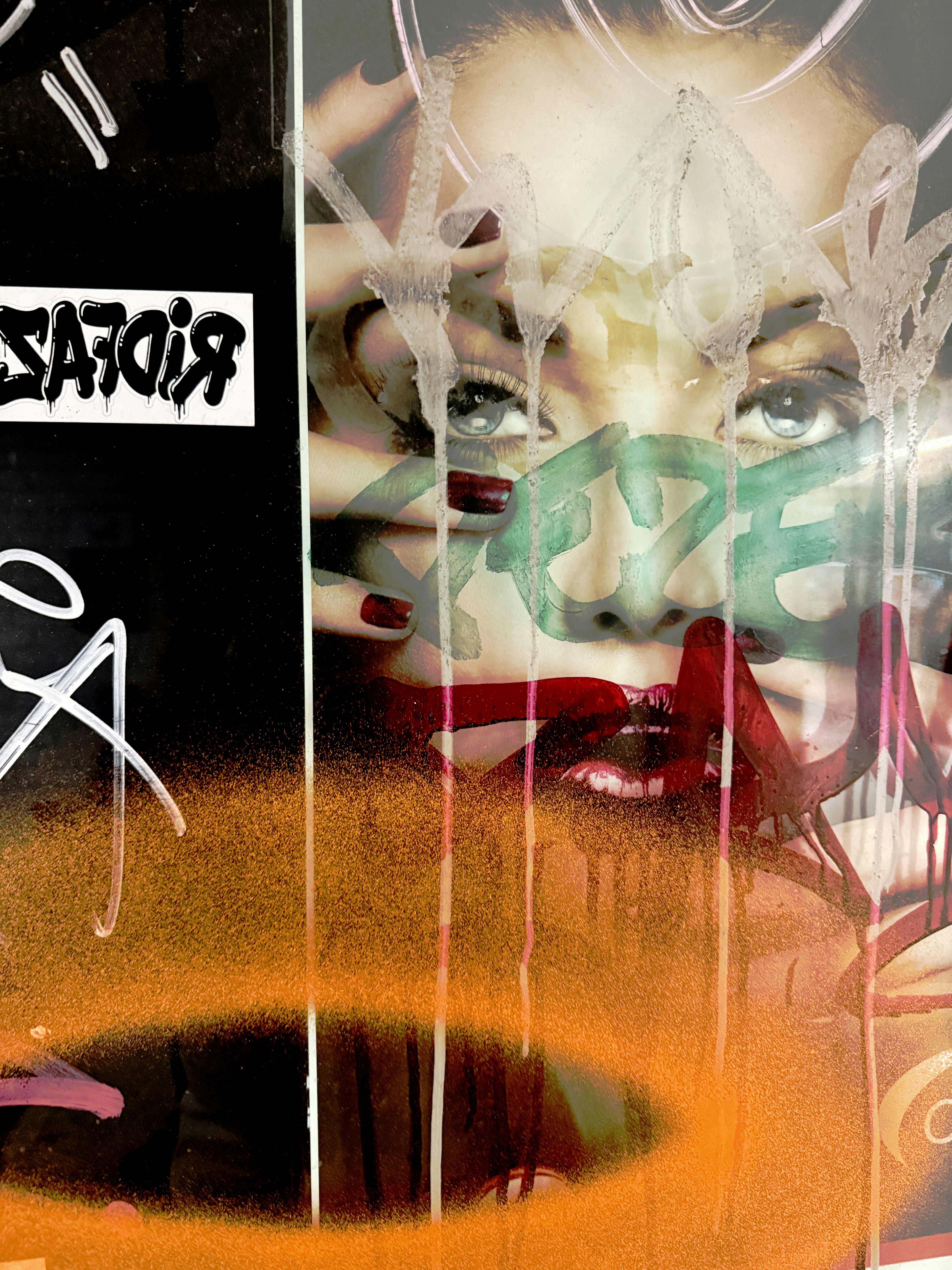 Masked gaze through graffiti glass