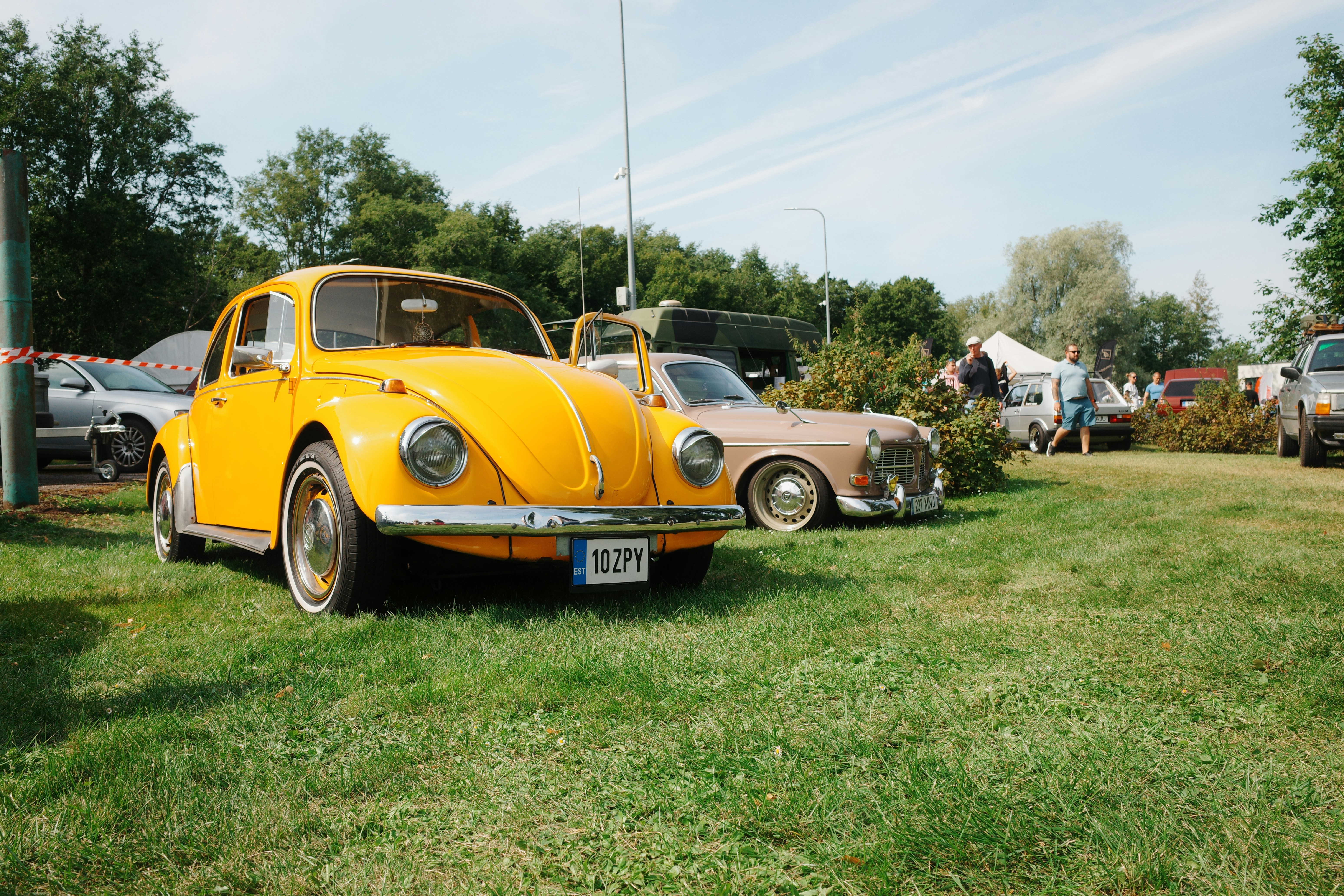 Yellow Beetle in a Quiet Car Show