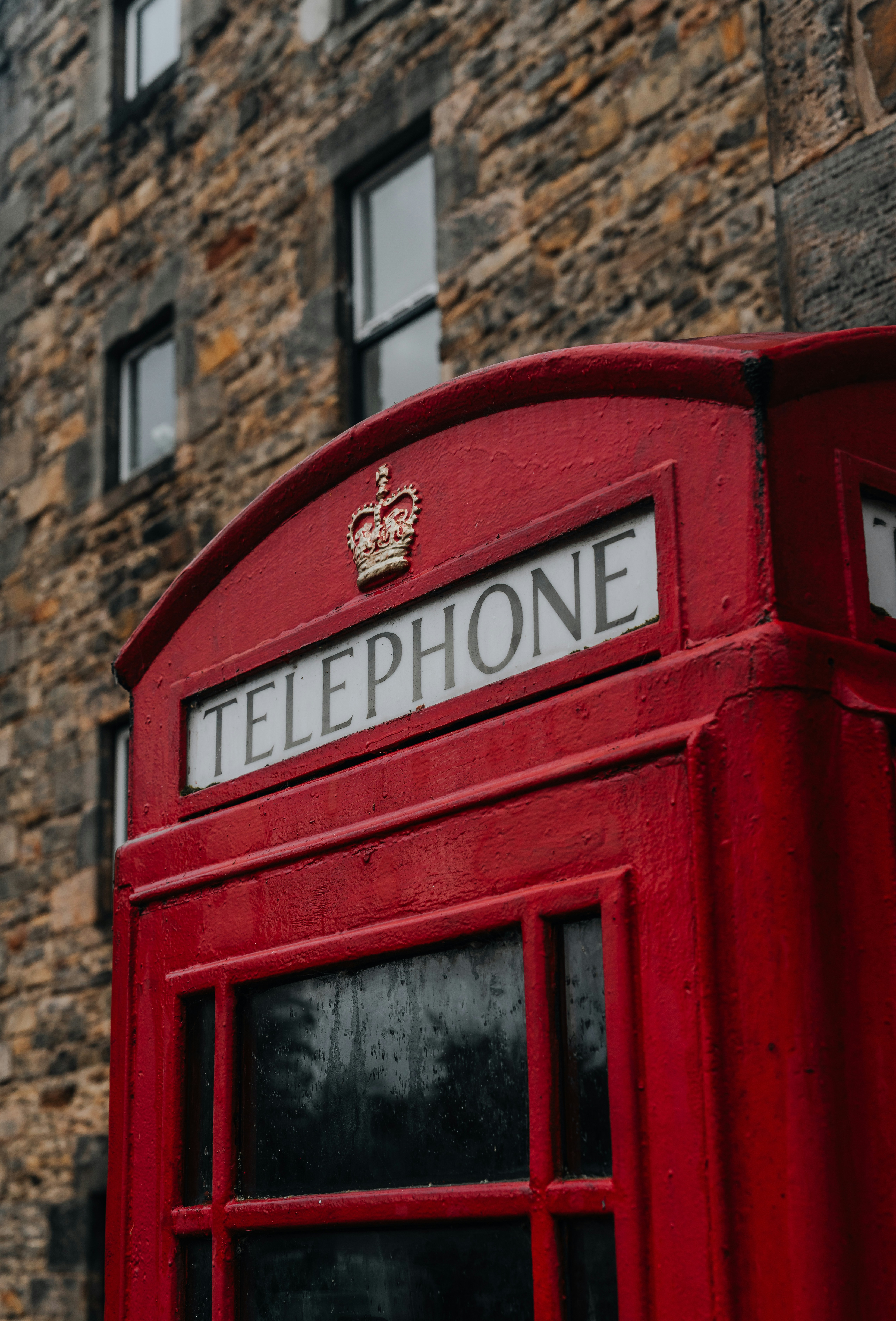 Red Guardian of the Street: A Classic British Kiosk in Focus