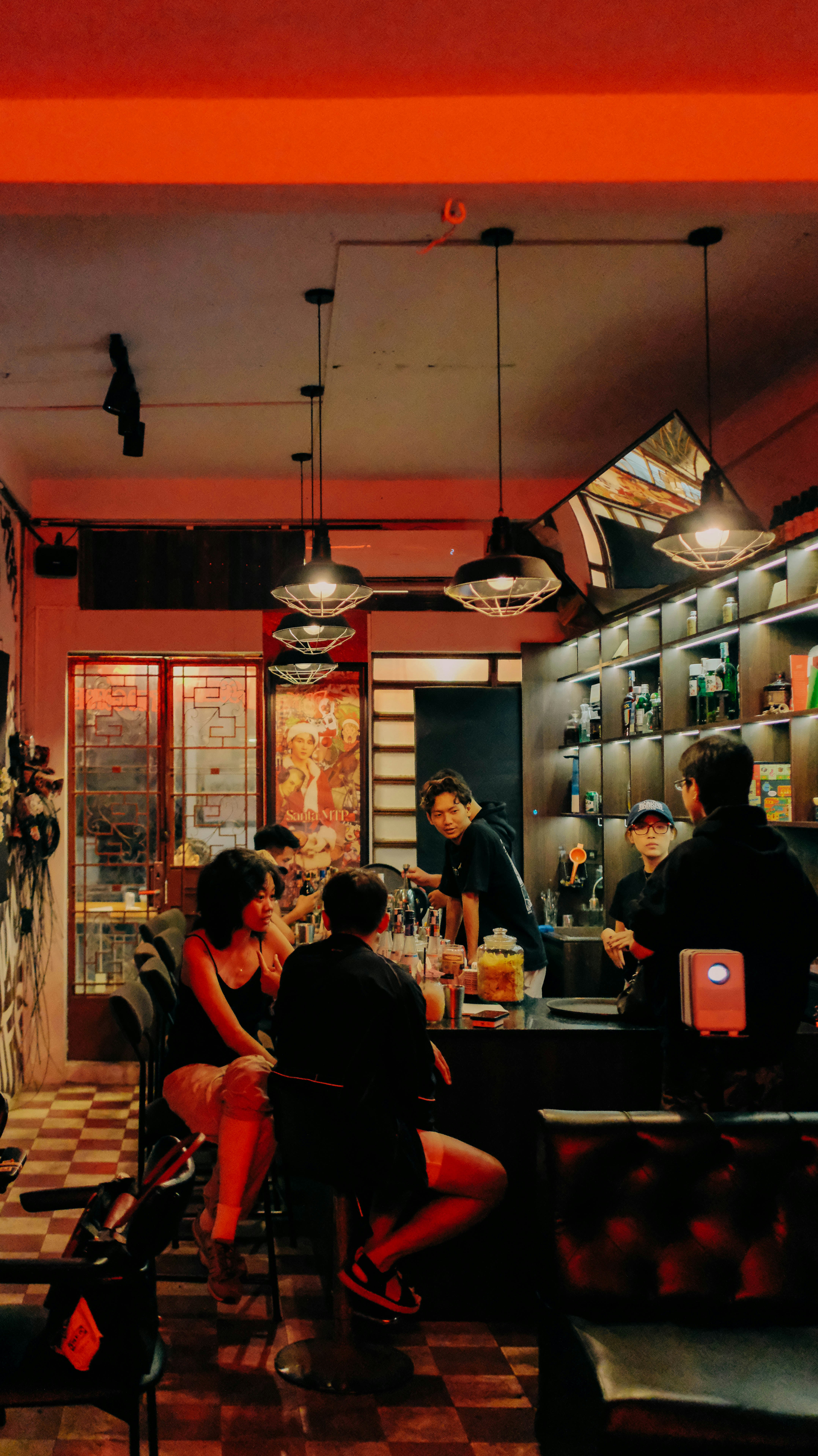 Midnight Brew: A Cozy Bar Scene with Sociable Group at the Counter