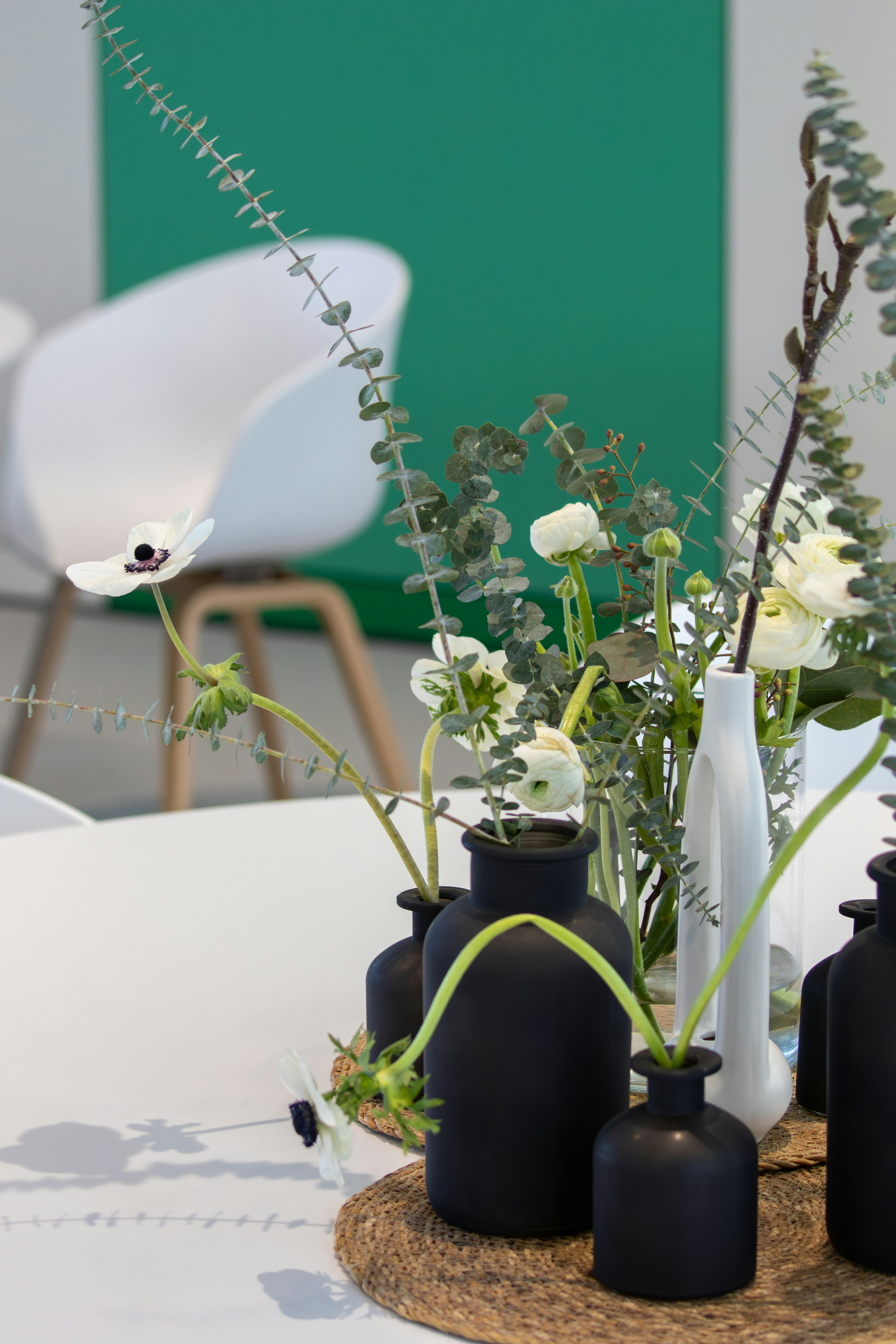Minimalist Floral Still Life in Matte Black Vases