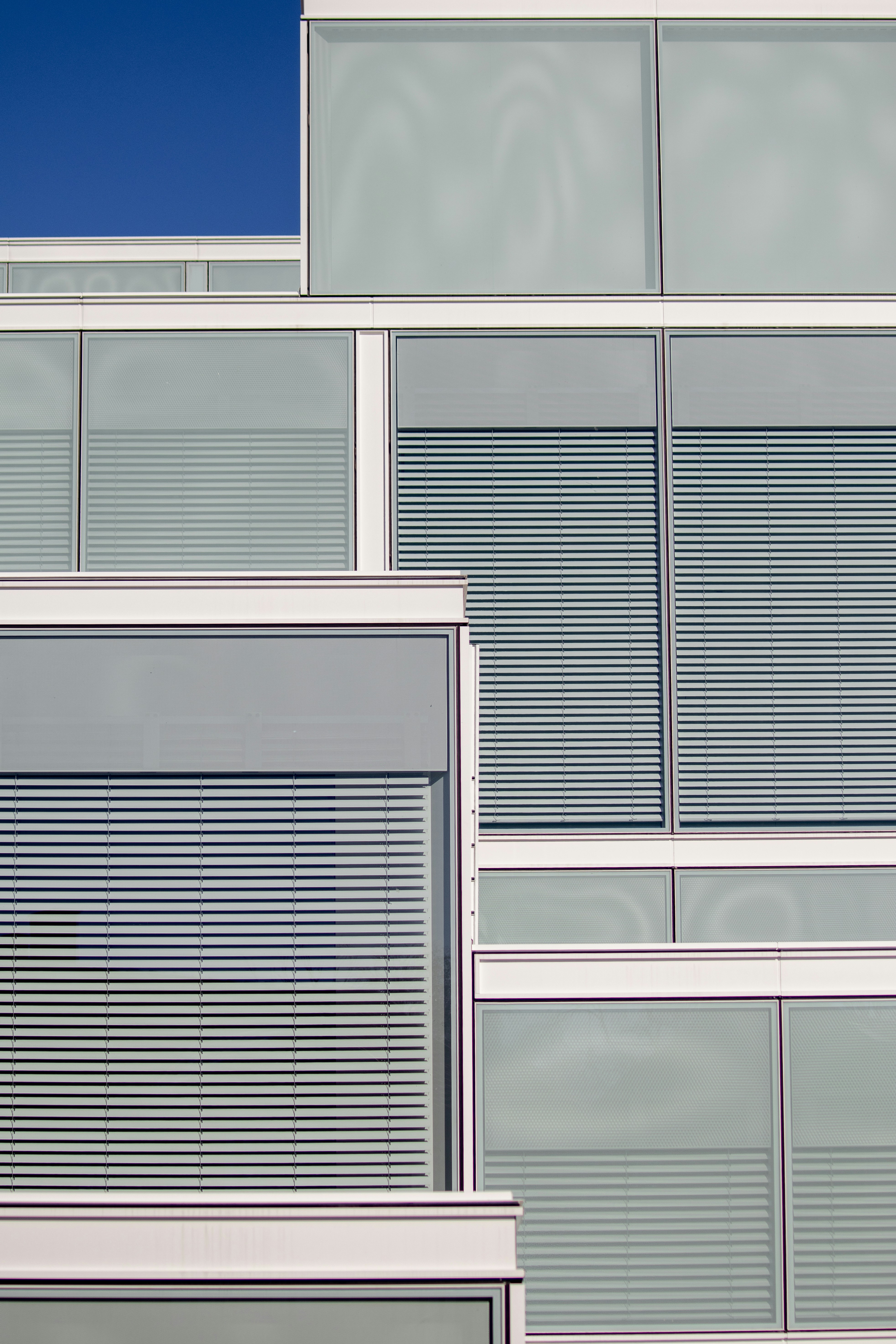Geometric Glass: A Faceted Facade in Quiet Lines