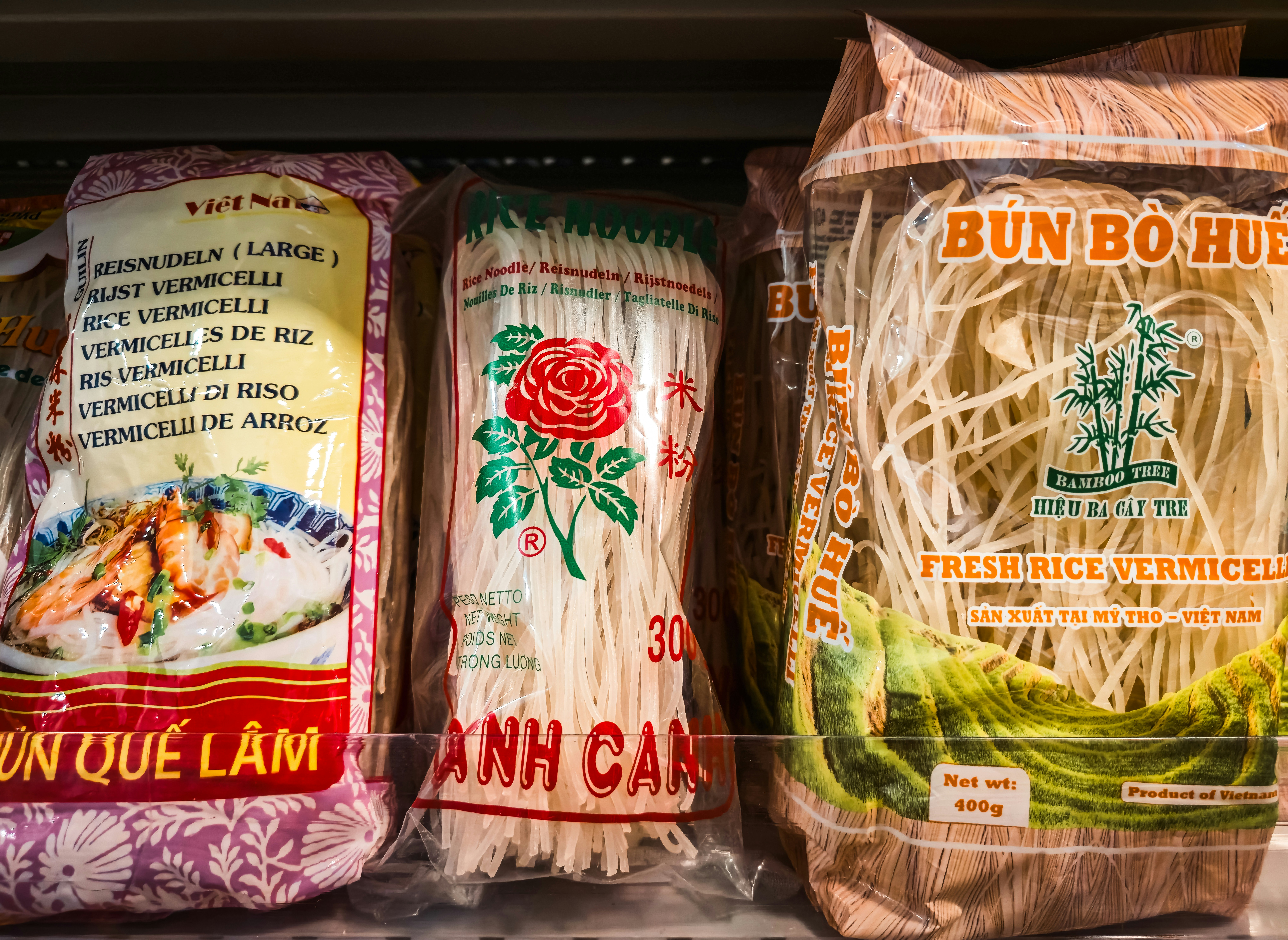 Vermicelli Voyage: A Row of Packaged Noodles in a Market Aisle