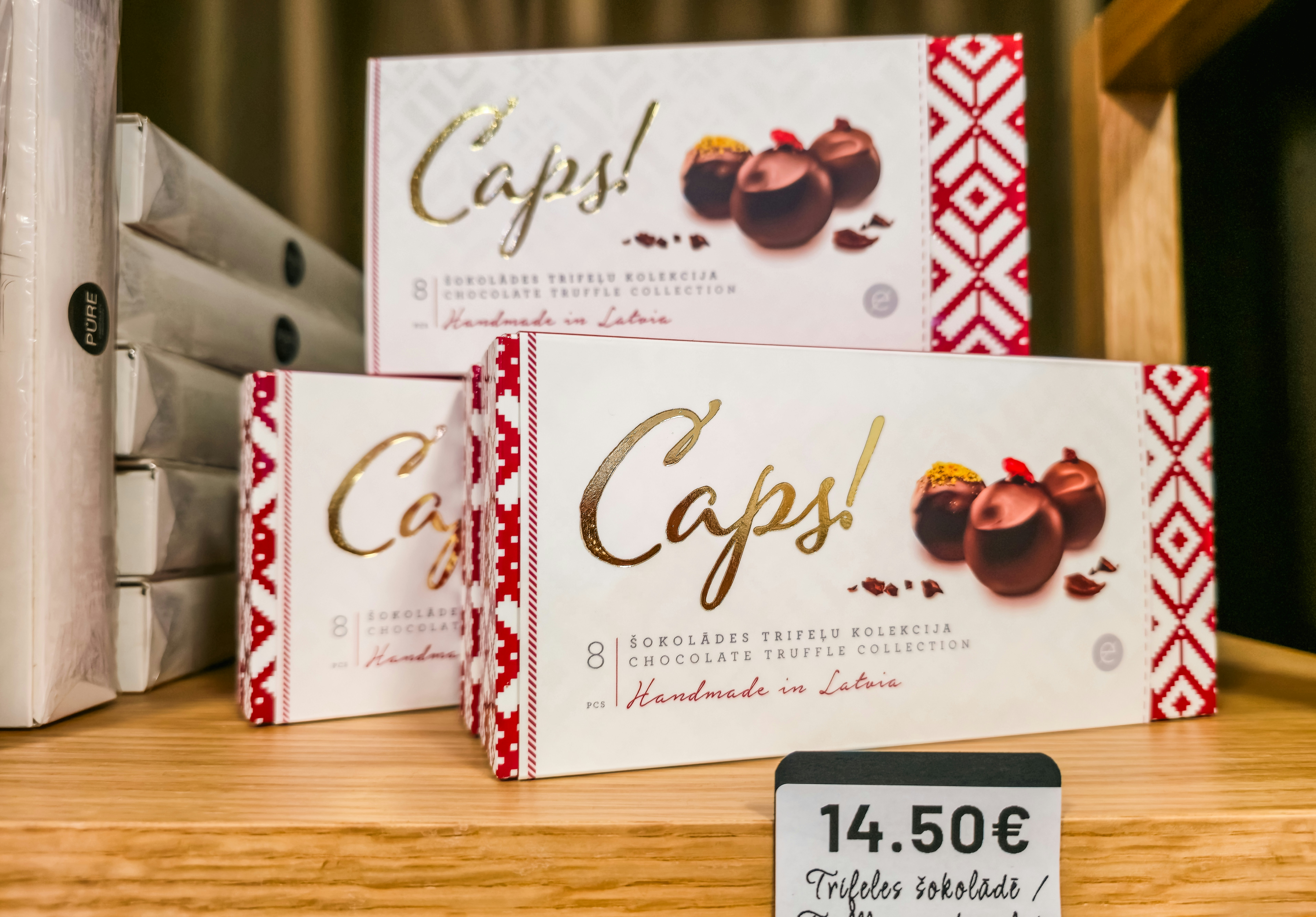 Caps! Handcrafted Truffles on a Wooden Shelf