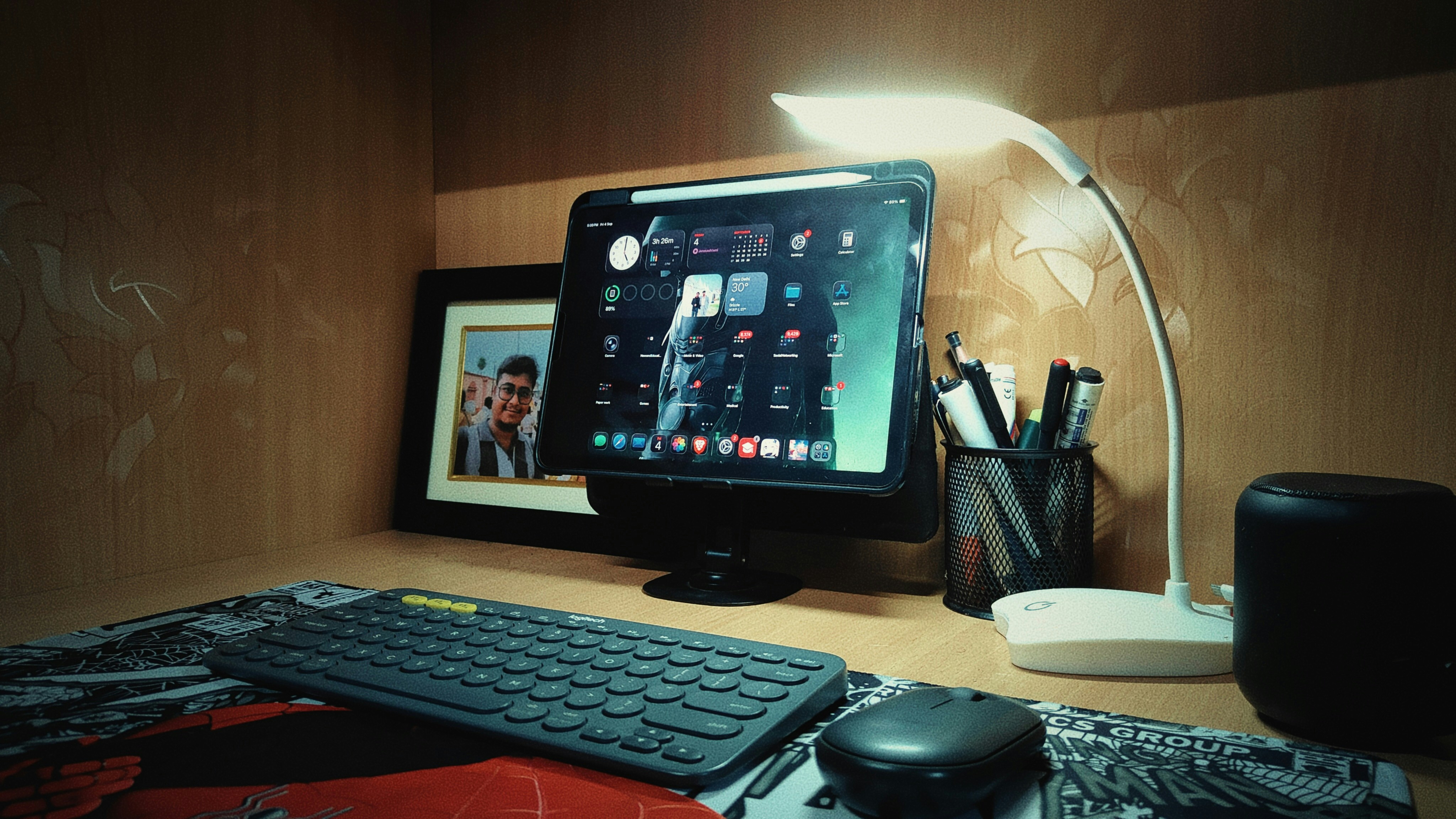 Tablet-centered desk setup with ambient glow