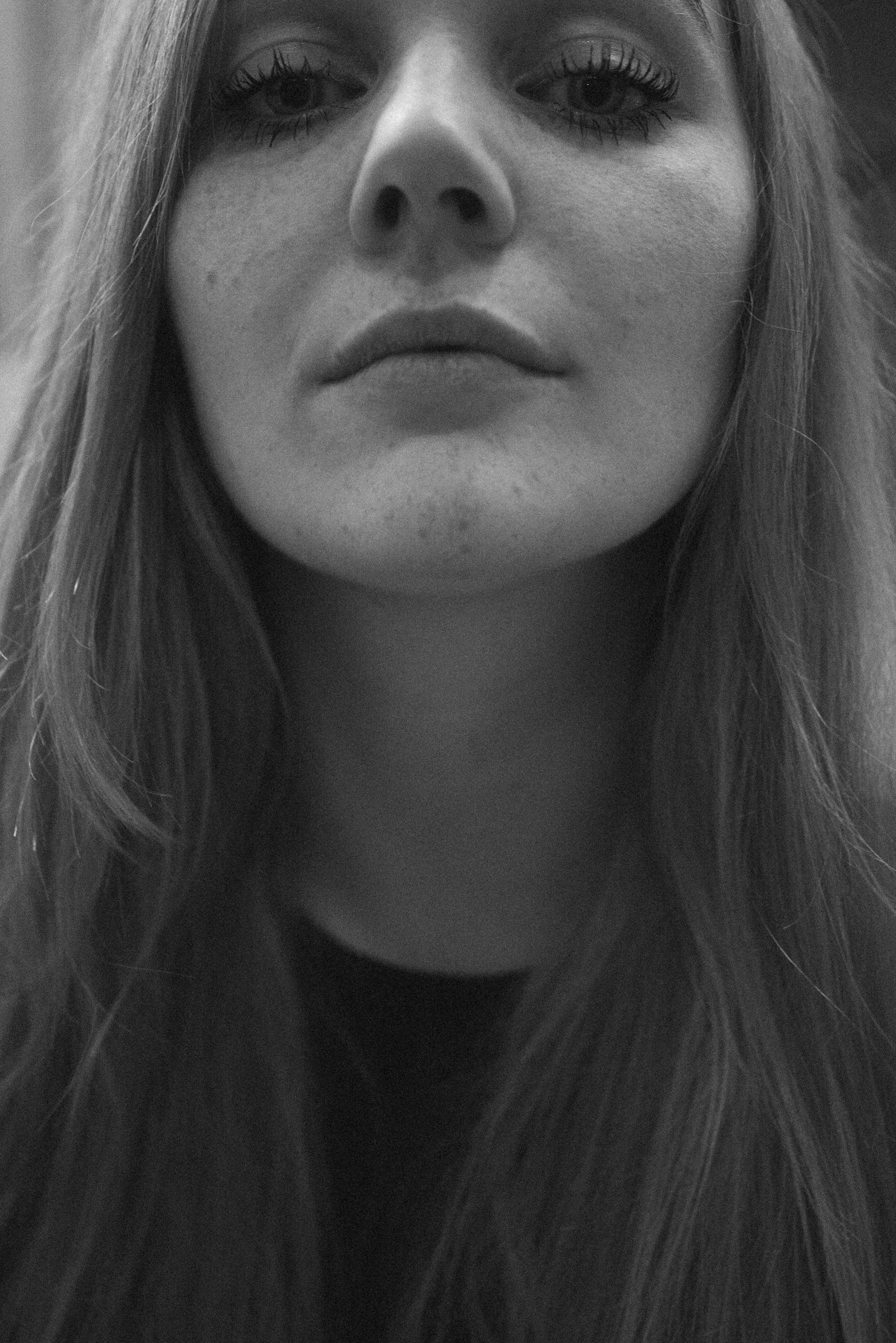 Upward Gaze: A Portrait Emphasizing Quiet Intensity
