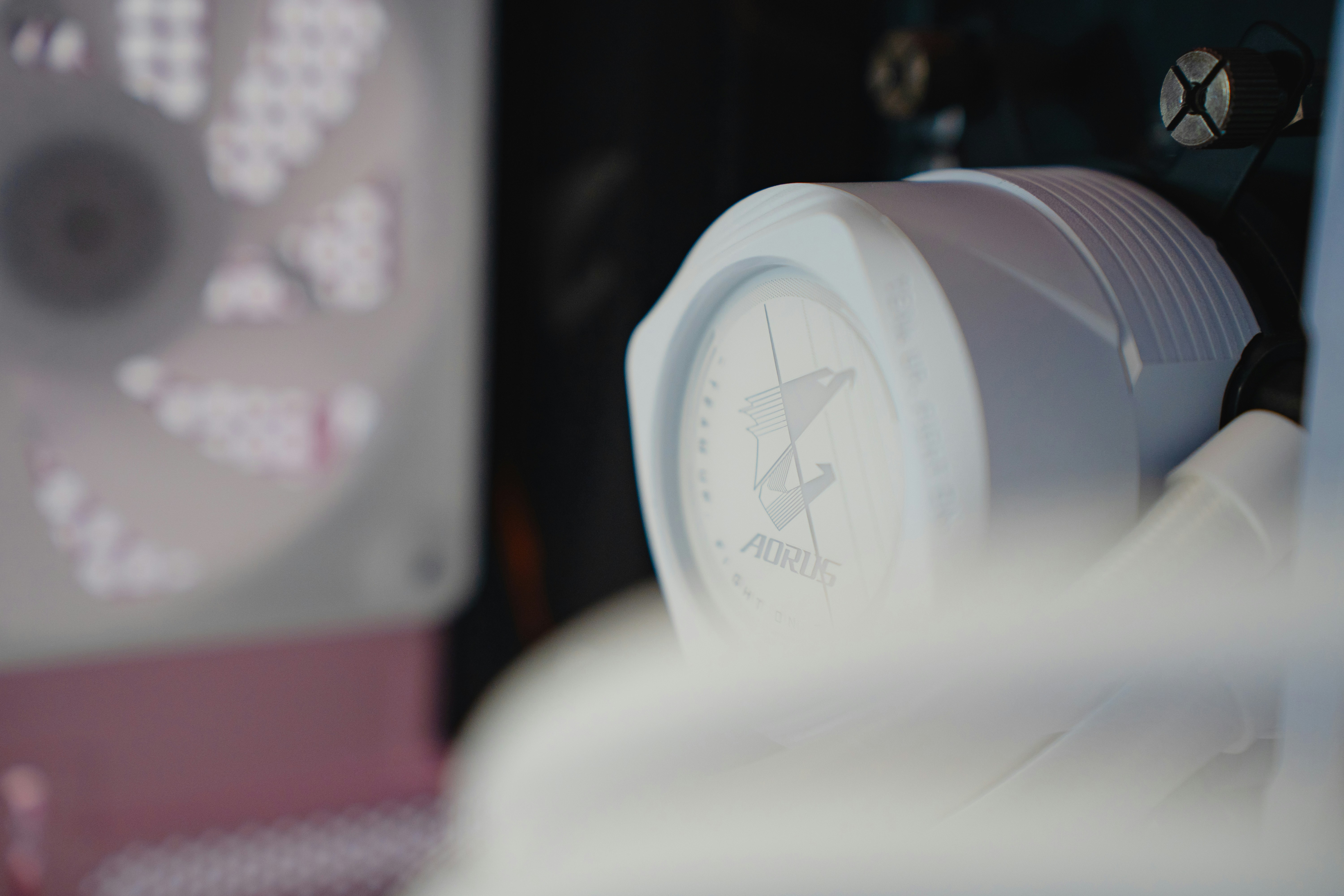 Quiet Mechanical Focus on a White Dial within a Server Rack
