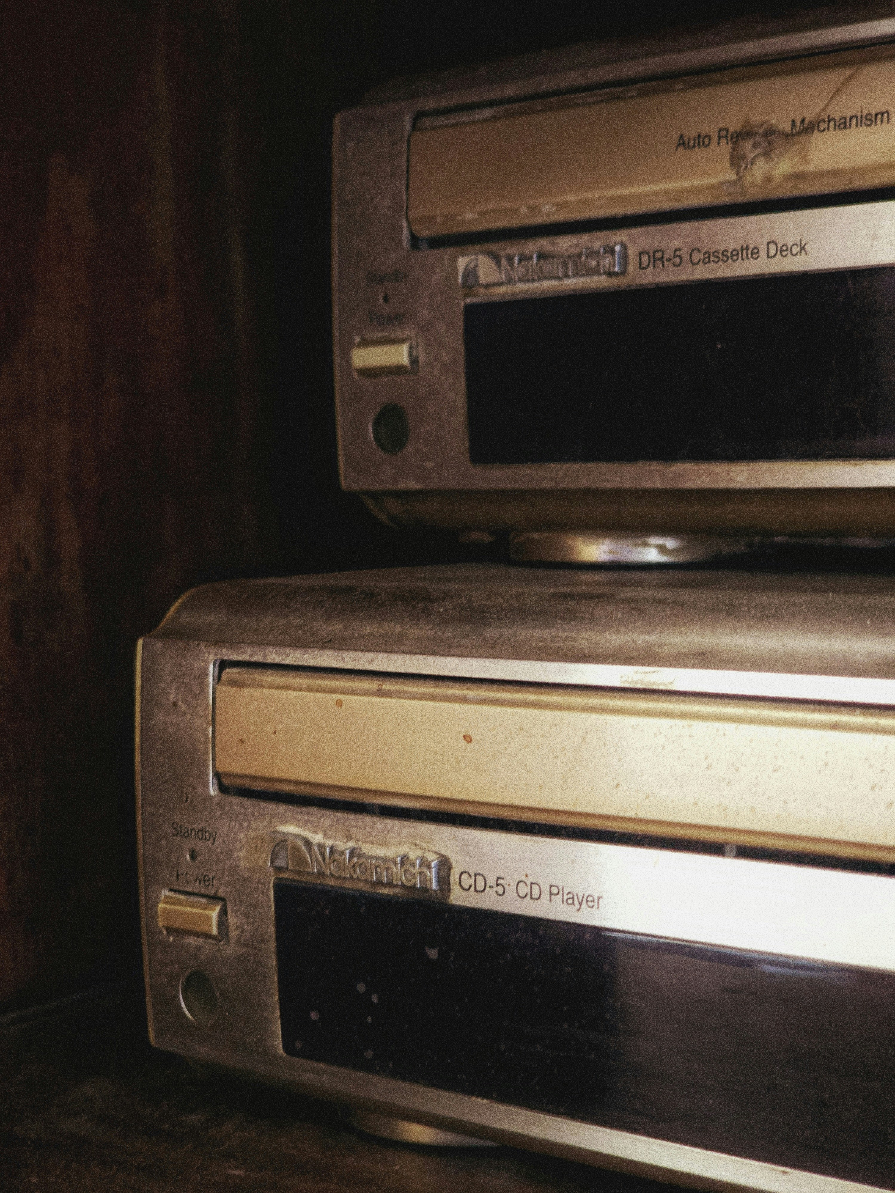 Dusty Stack of Vintage Decks: A Quiet Shelf Portrait