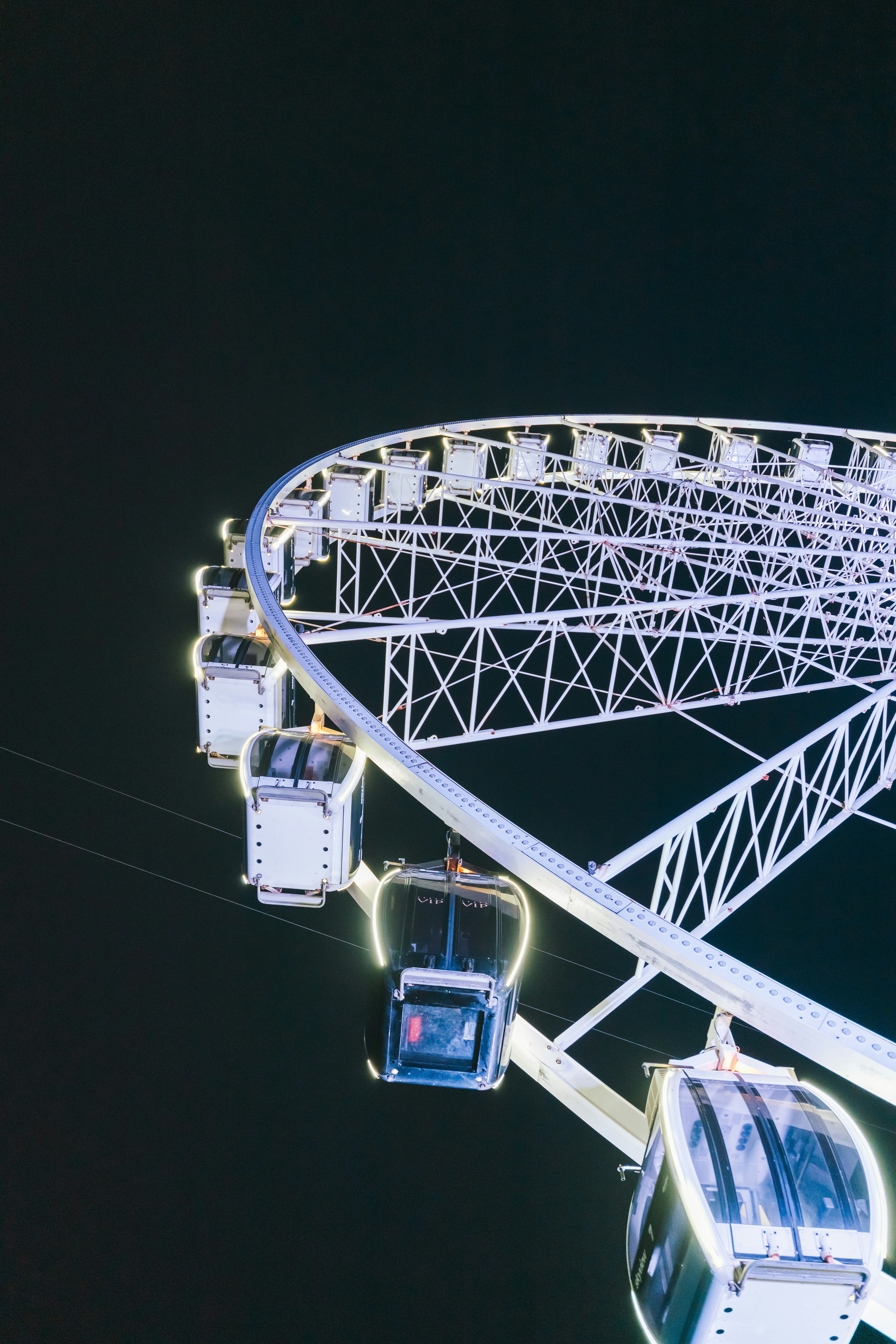 Circular ascent: a night ride on the illuminated Ferris wheel