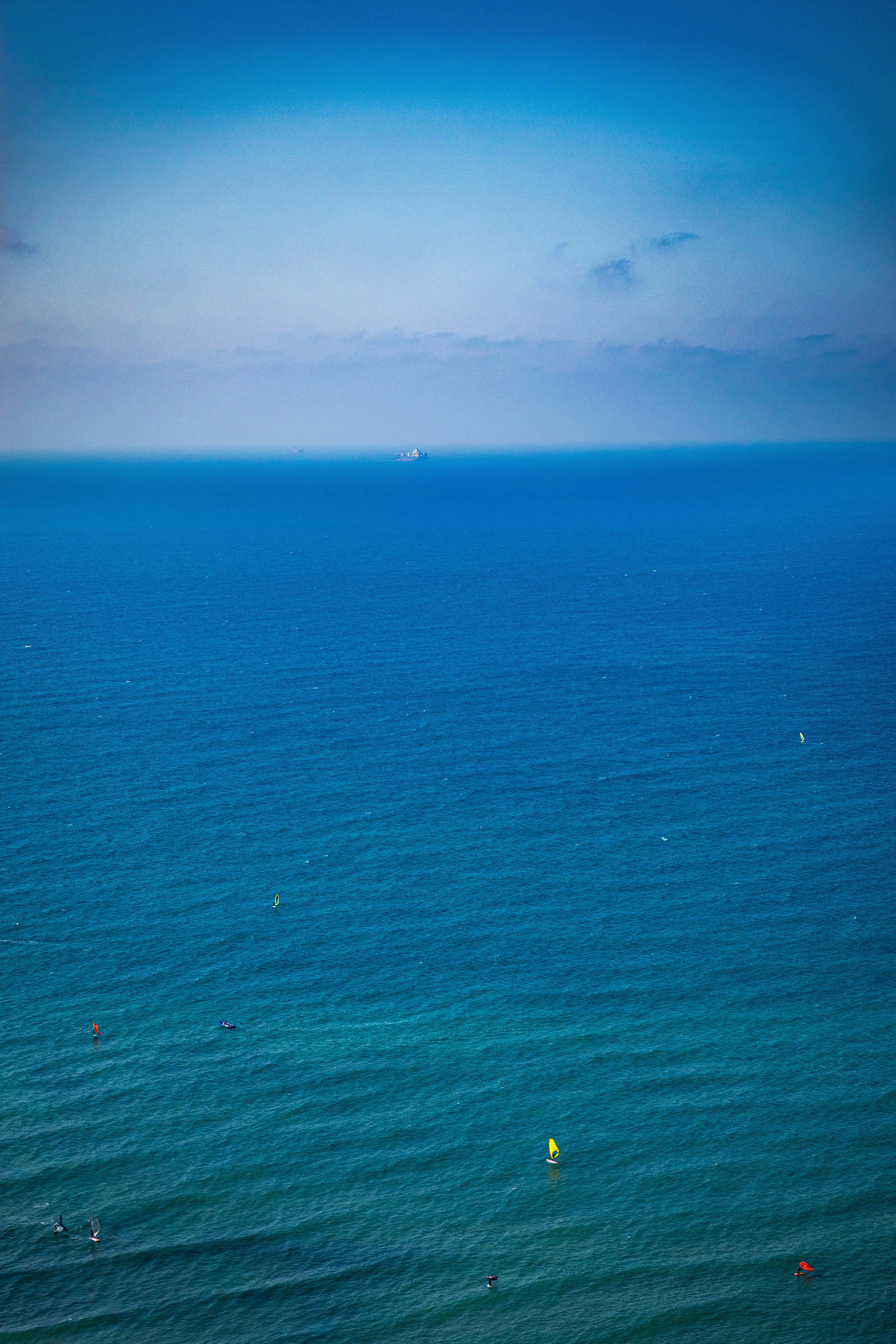 Mid-Deep Horizon: A Quiet Ship on Blue Expanse
