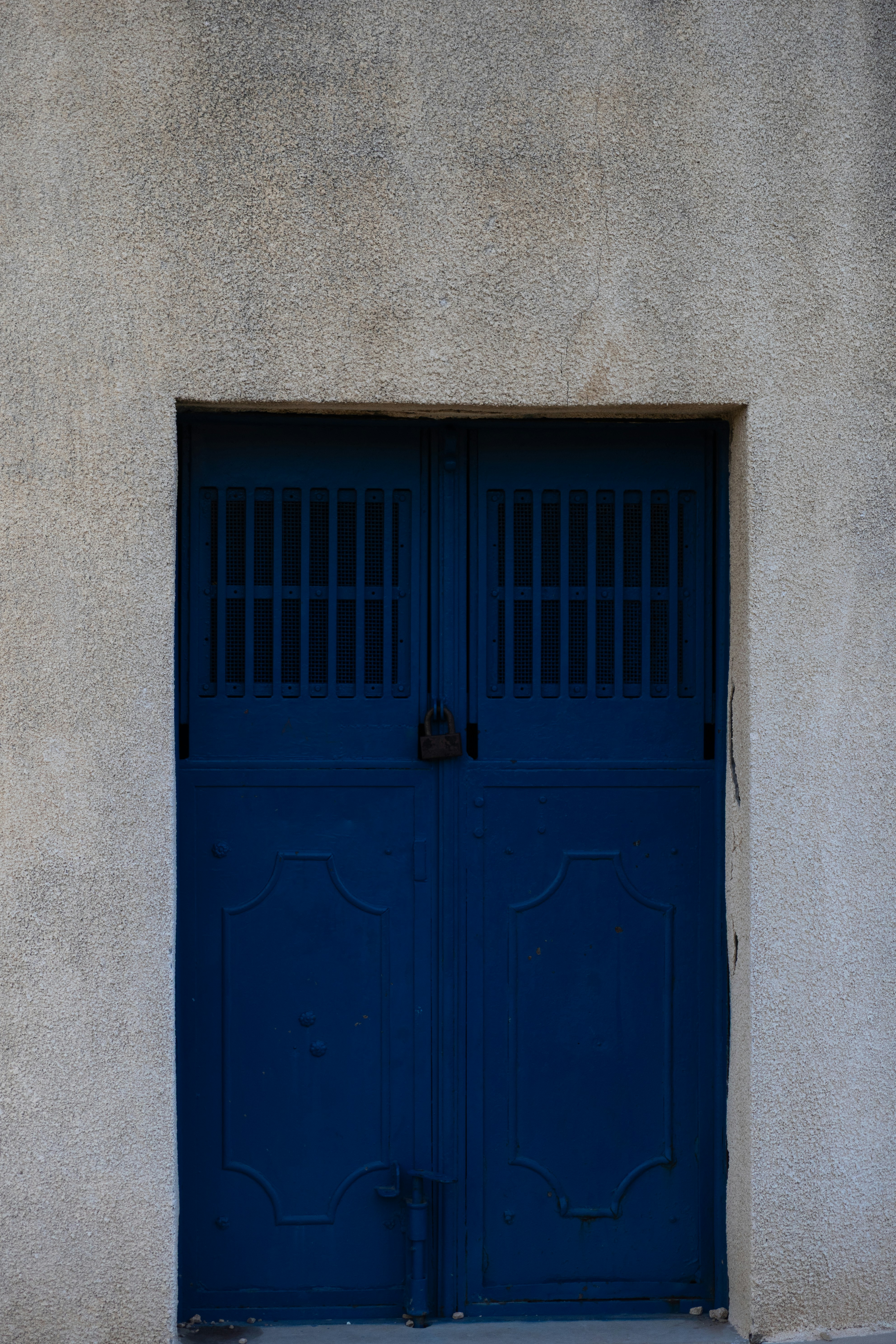 Midday Stillness at the Blue Door