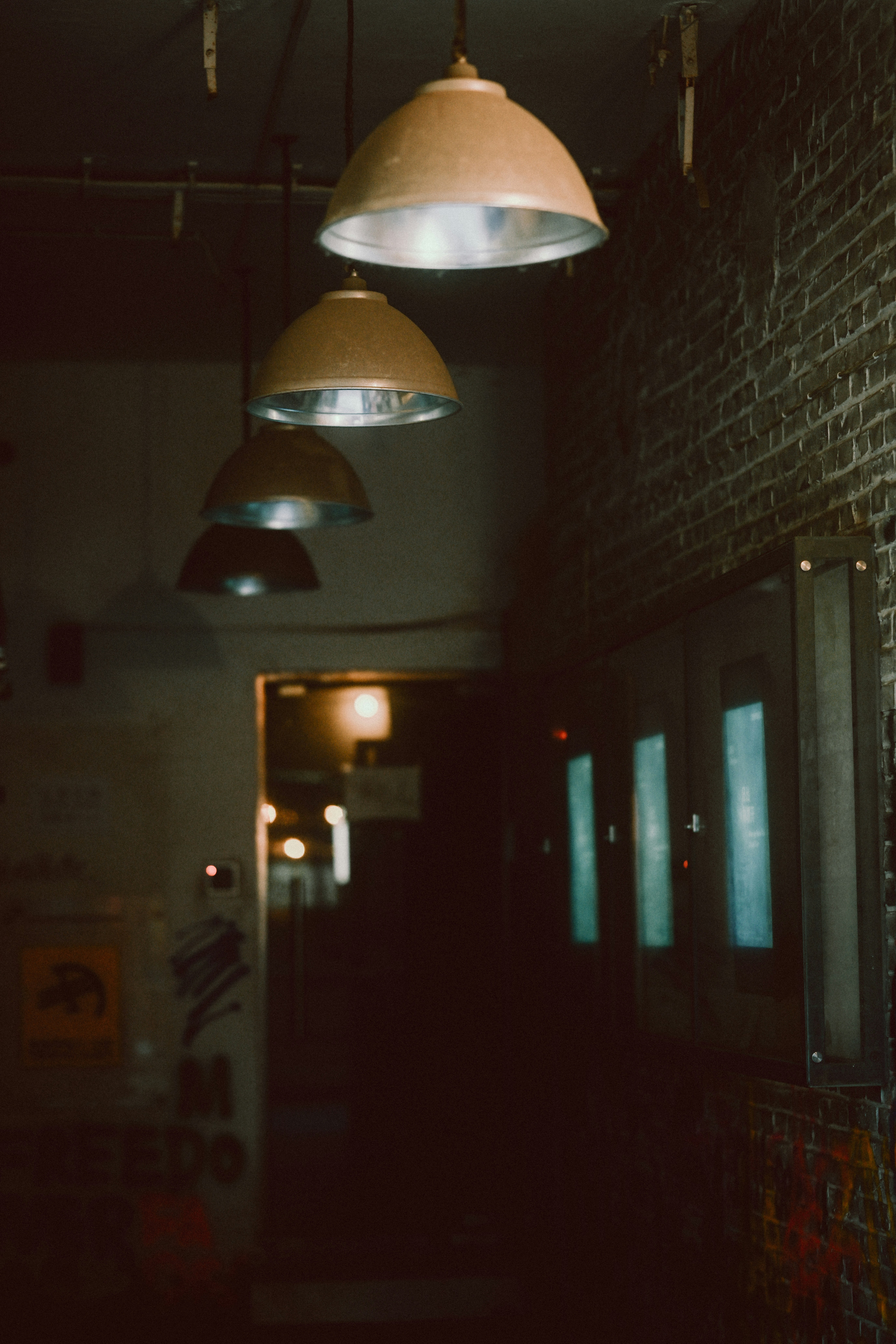 Dim Corridor of Lamps: A Quiet Descent into the Unknown