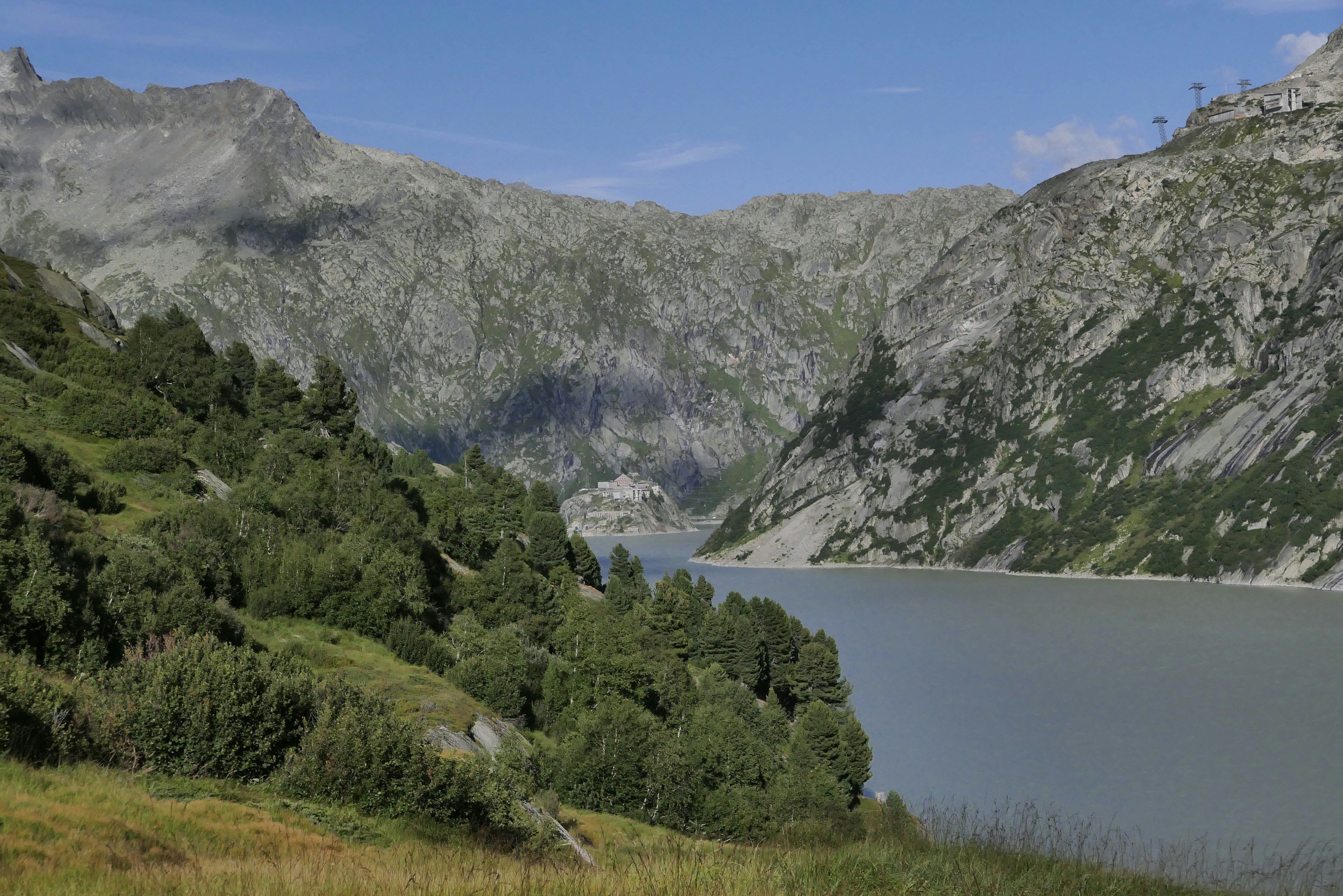 Glacial Basin Overlook: A Lake Surrounded by Alpine Peaks