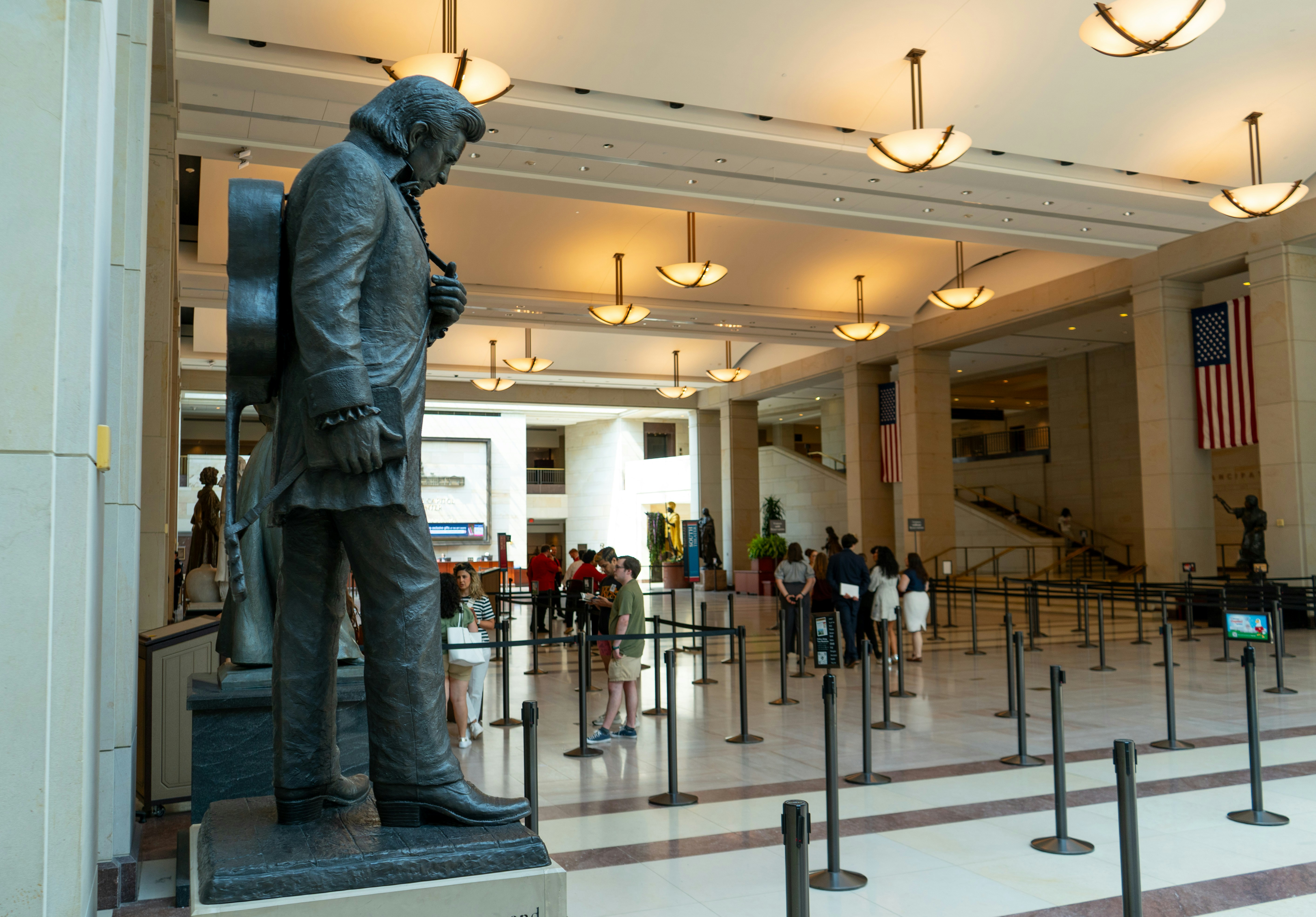 Guarded Gaze: A Statue in the American Museum Lobby