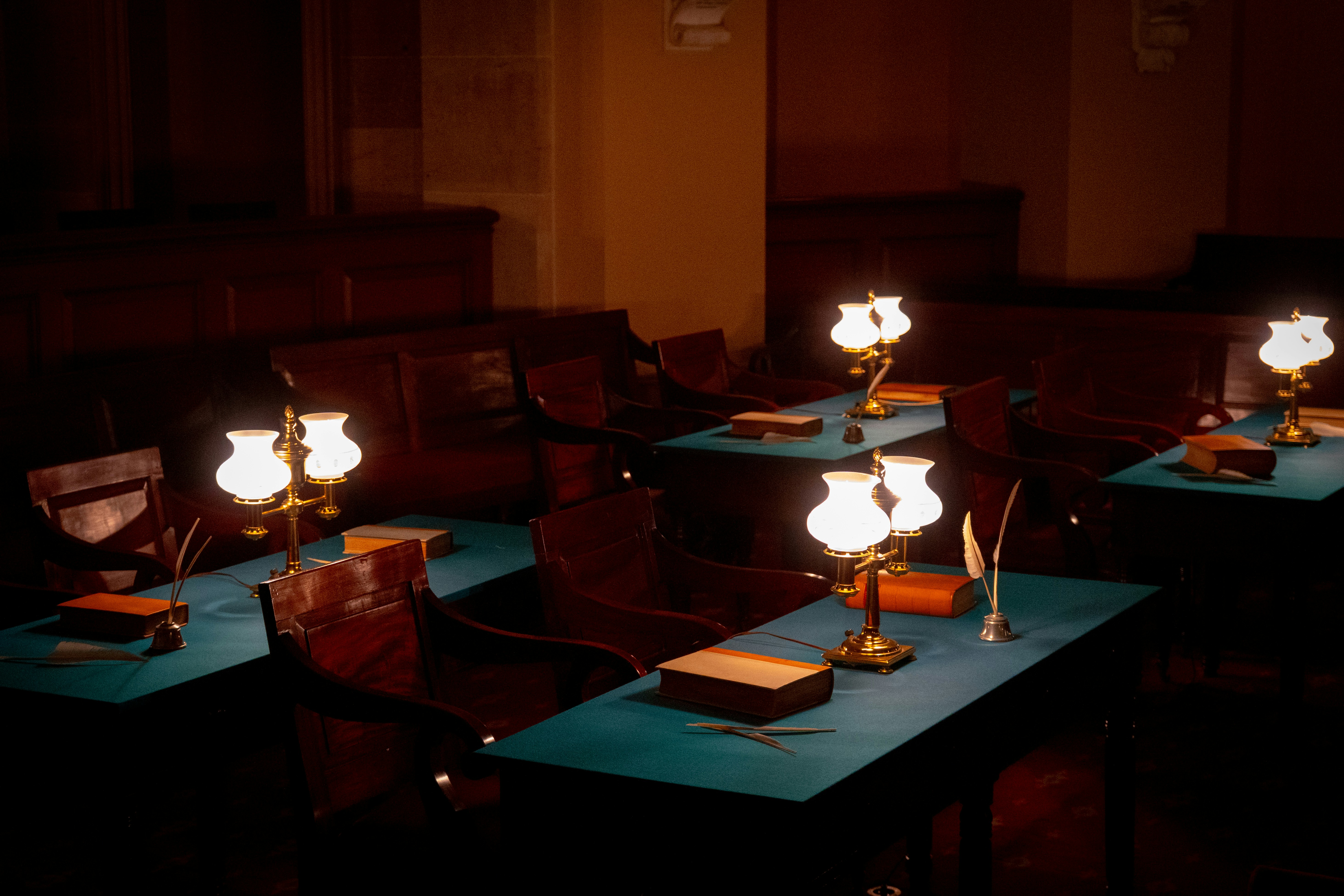 Low-lit Bistro Tables with Warm Table Lamps