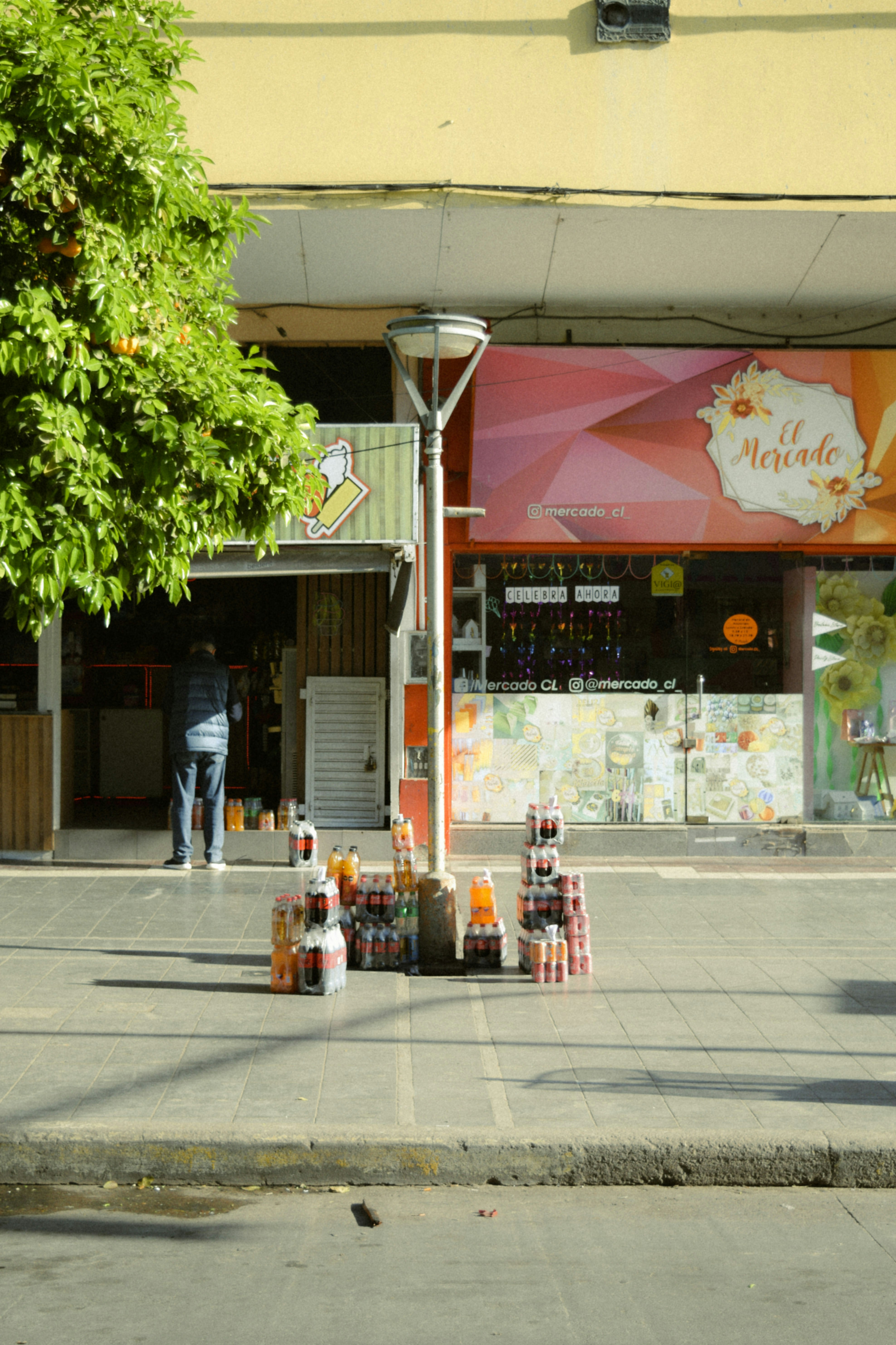 Street Corner Market Display: Bottles Arranged for Sale