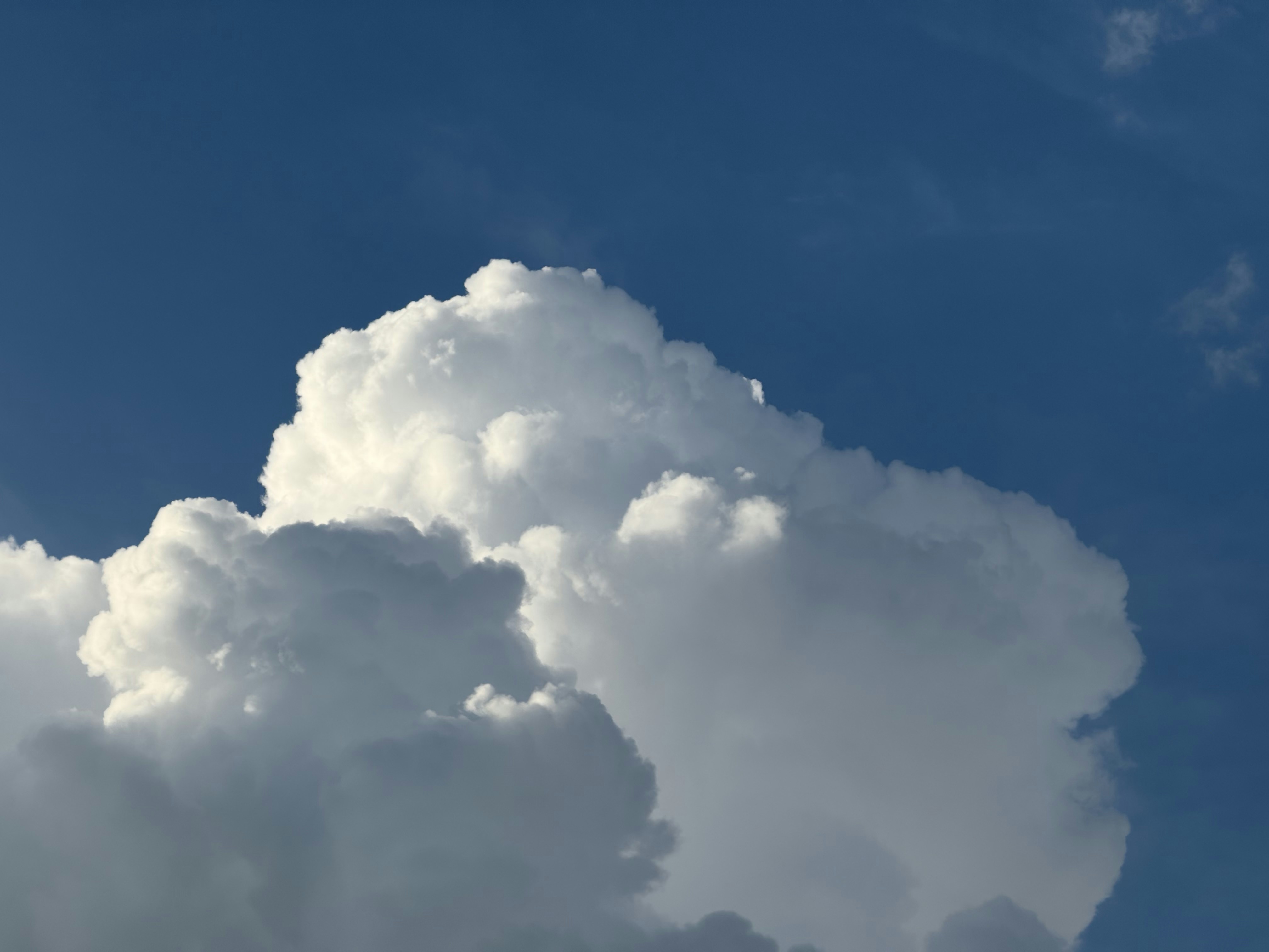 Cloud Monument: A Sunlit Tower of Puff